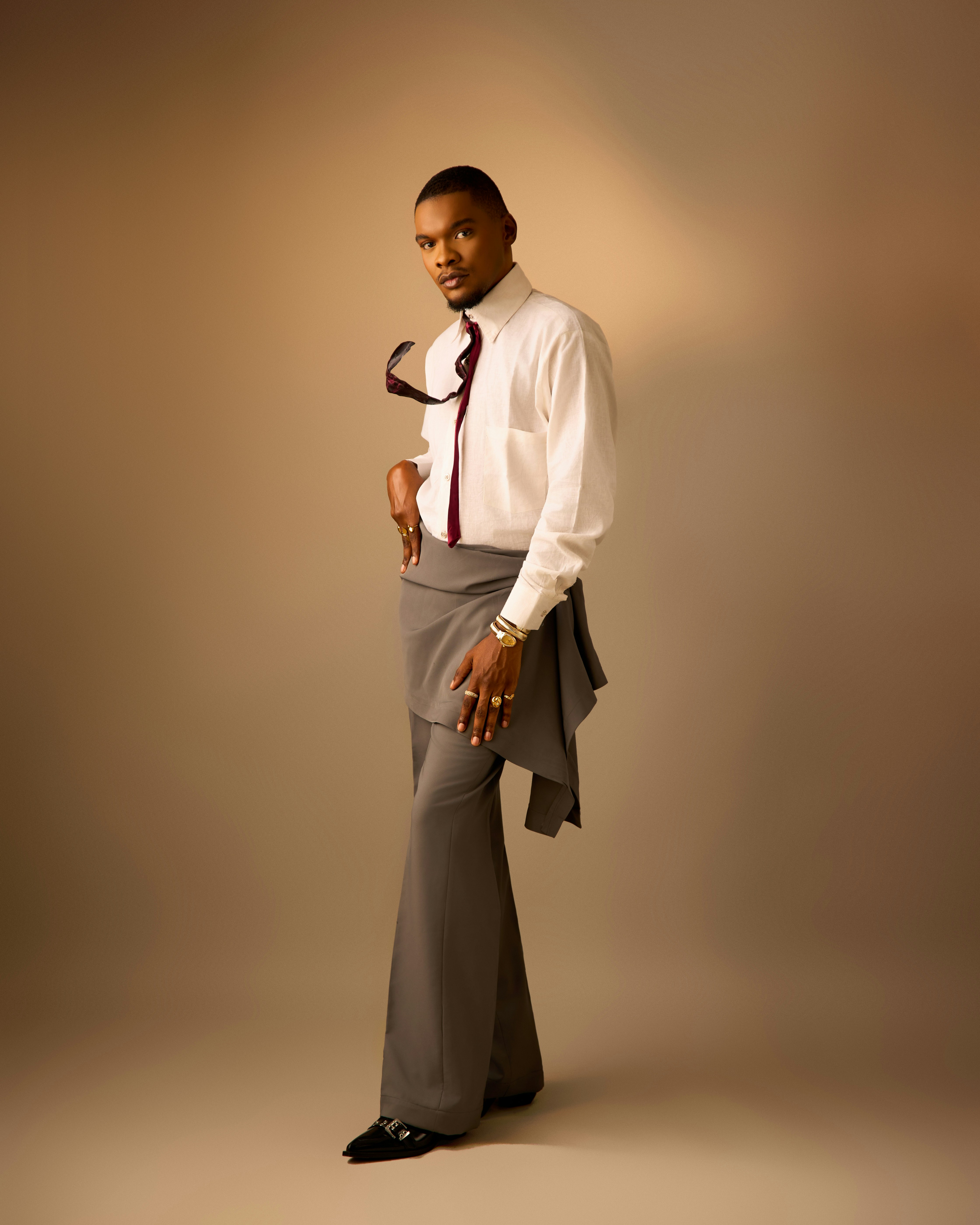 Precision Poise: A Longevity of Style in Warm Tilded Light