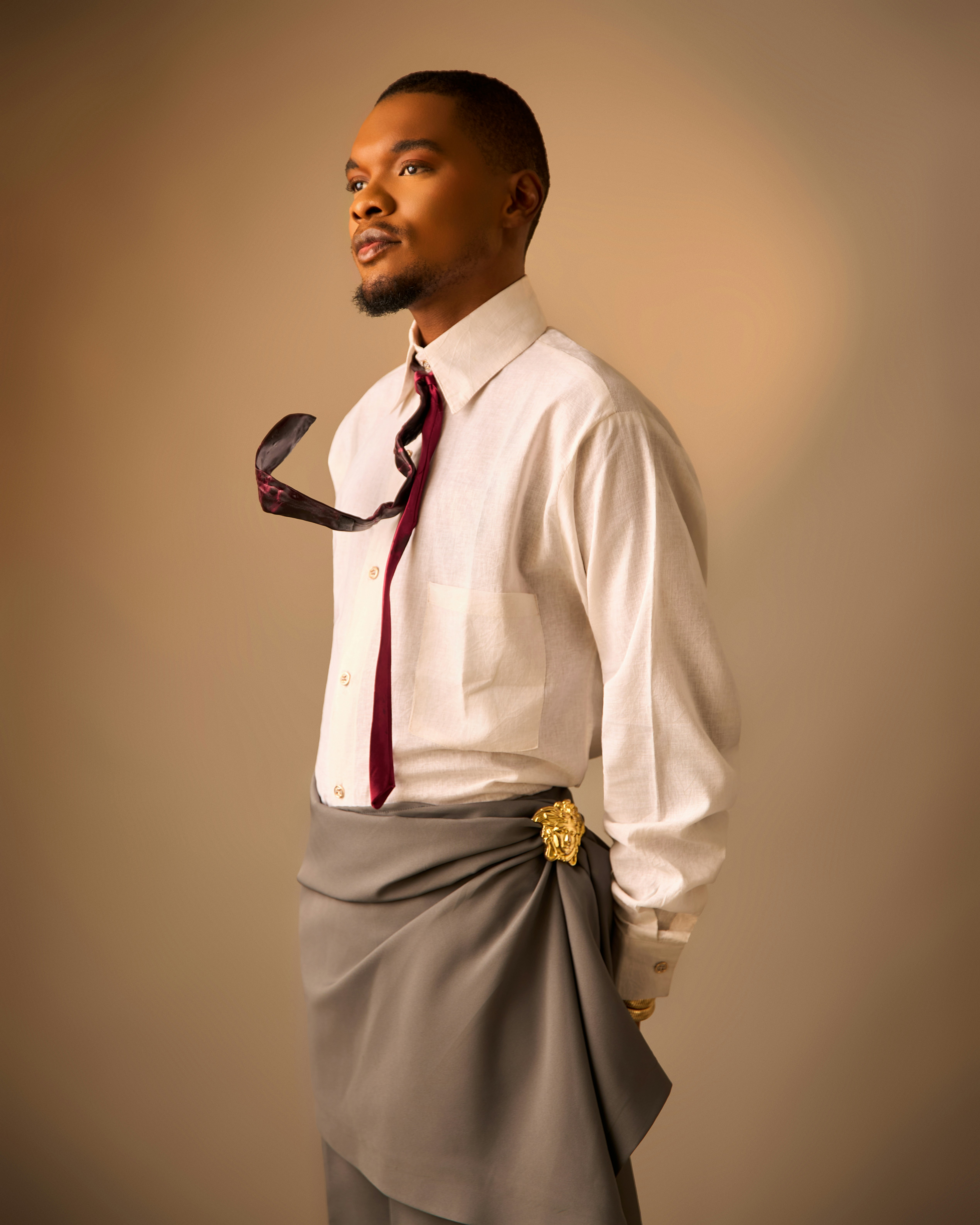 Gentle Confidence: A Portrait in Soft Light and Draped Tradition