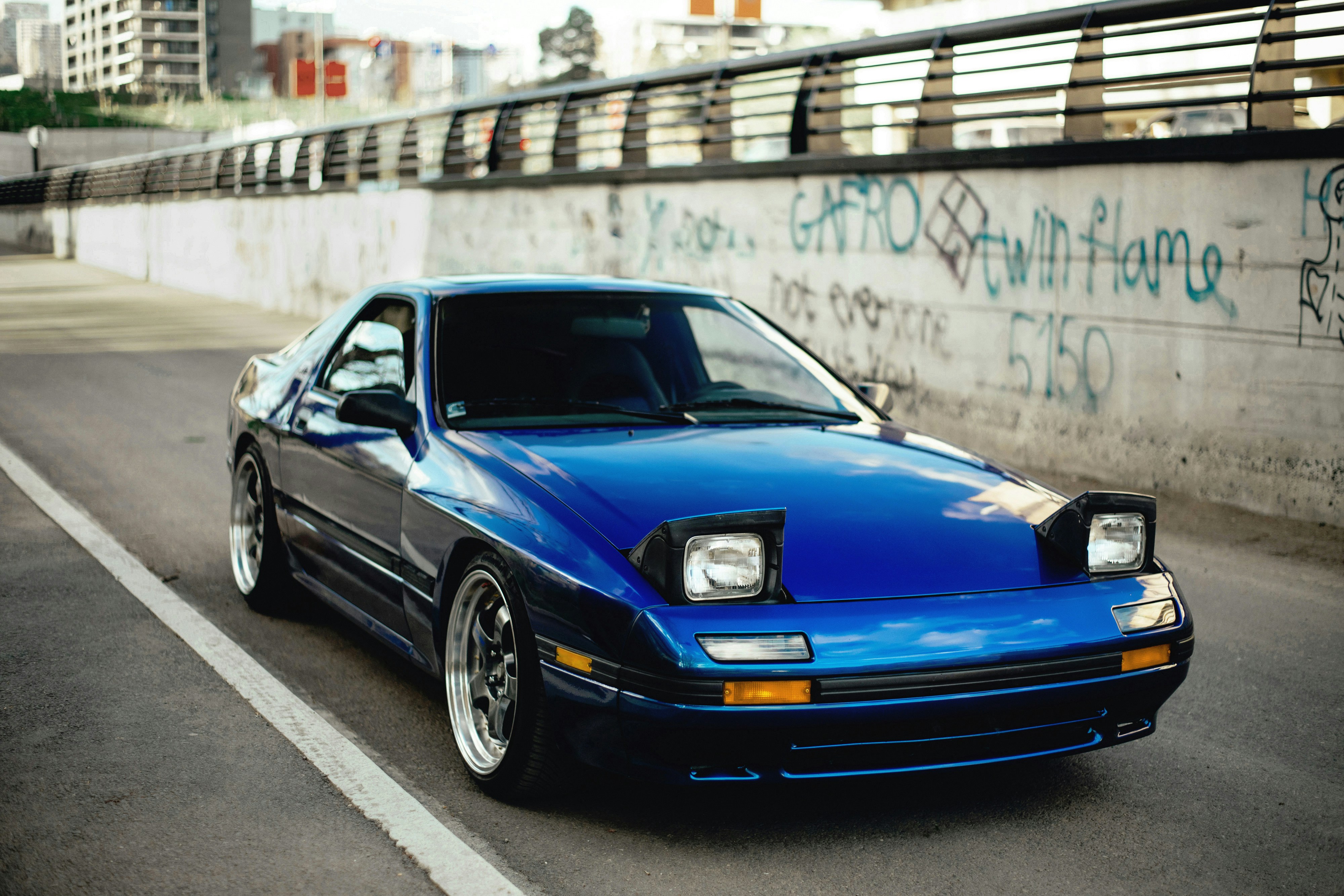 Blue Classic Stance: A Side-Wheel Symphony in an Urban Tunnel