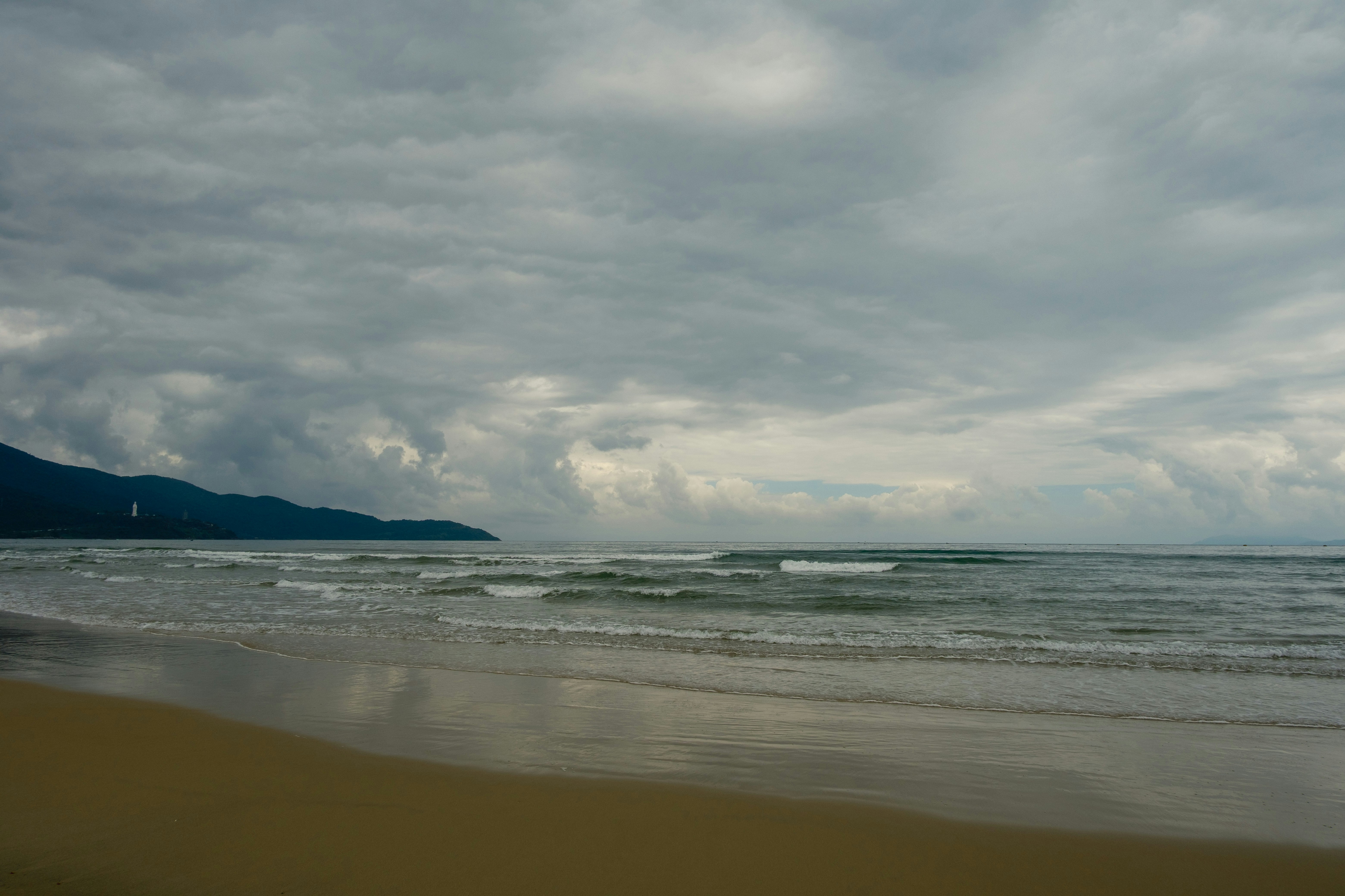 Clouds Over the Quiet Shore: A Horizon in Soft Light