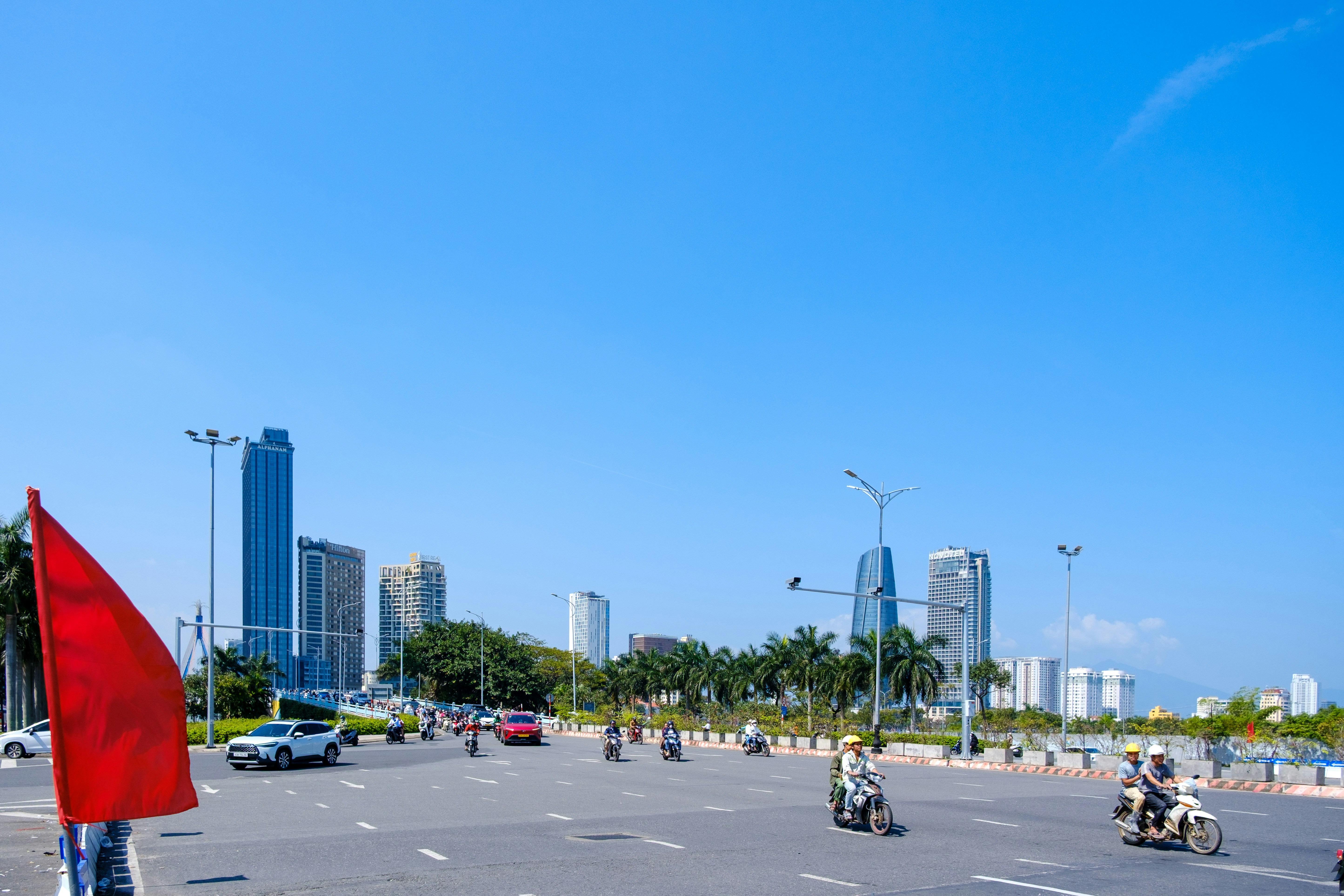 City Riders on a Wide Ocean of Asphalt