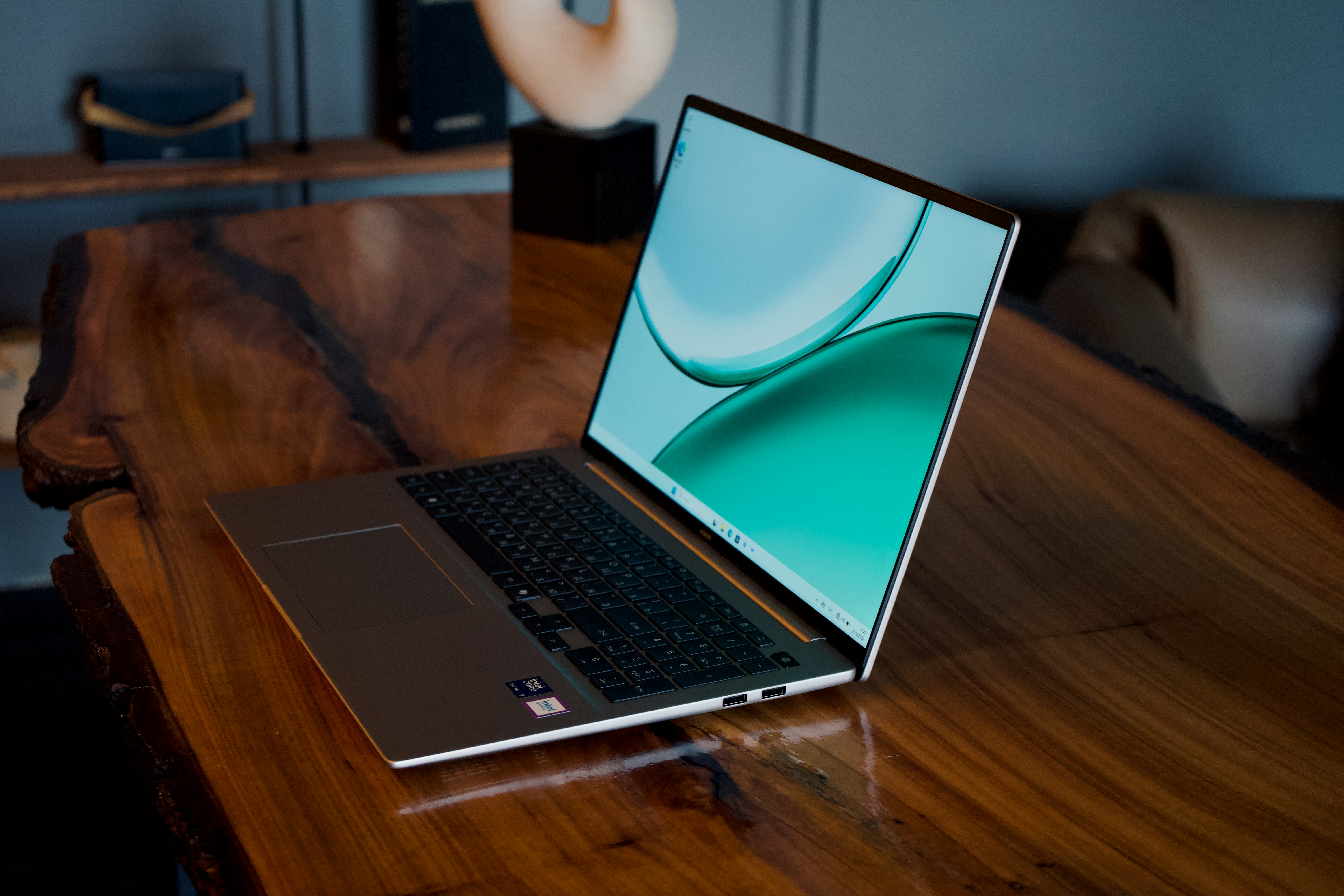 Laptop on a glossy wooden table: a minimalist workstation moment