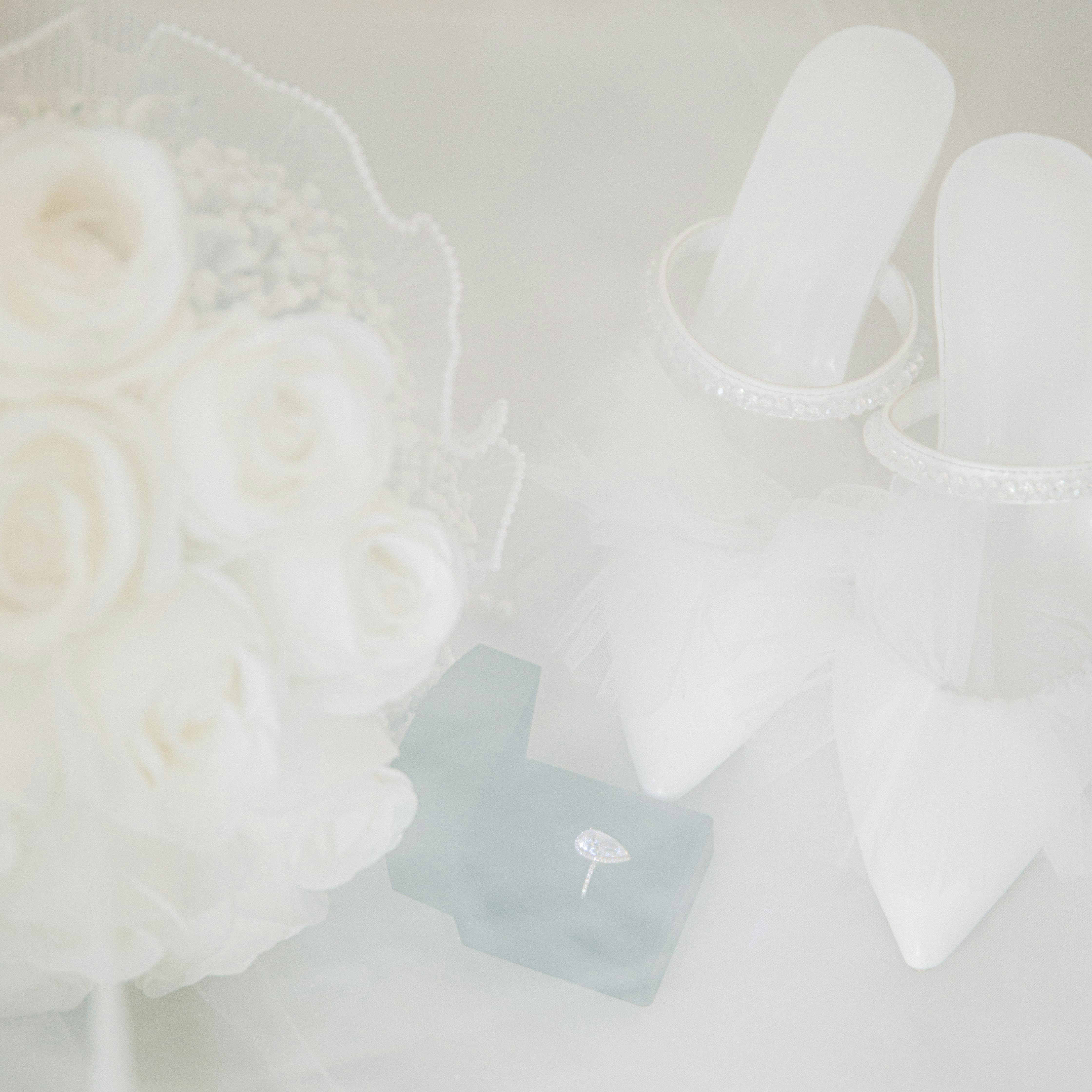 Soft Illumination of Bridal Elements: A Subtle Ring on Velvet Reflecting Light
