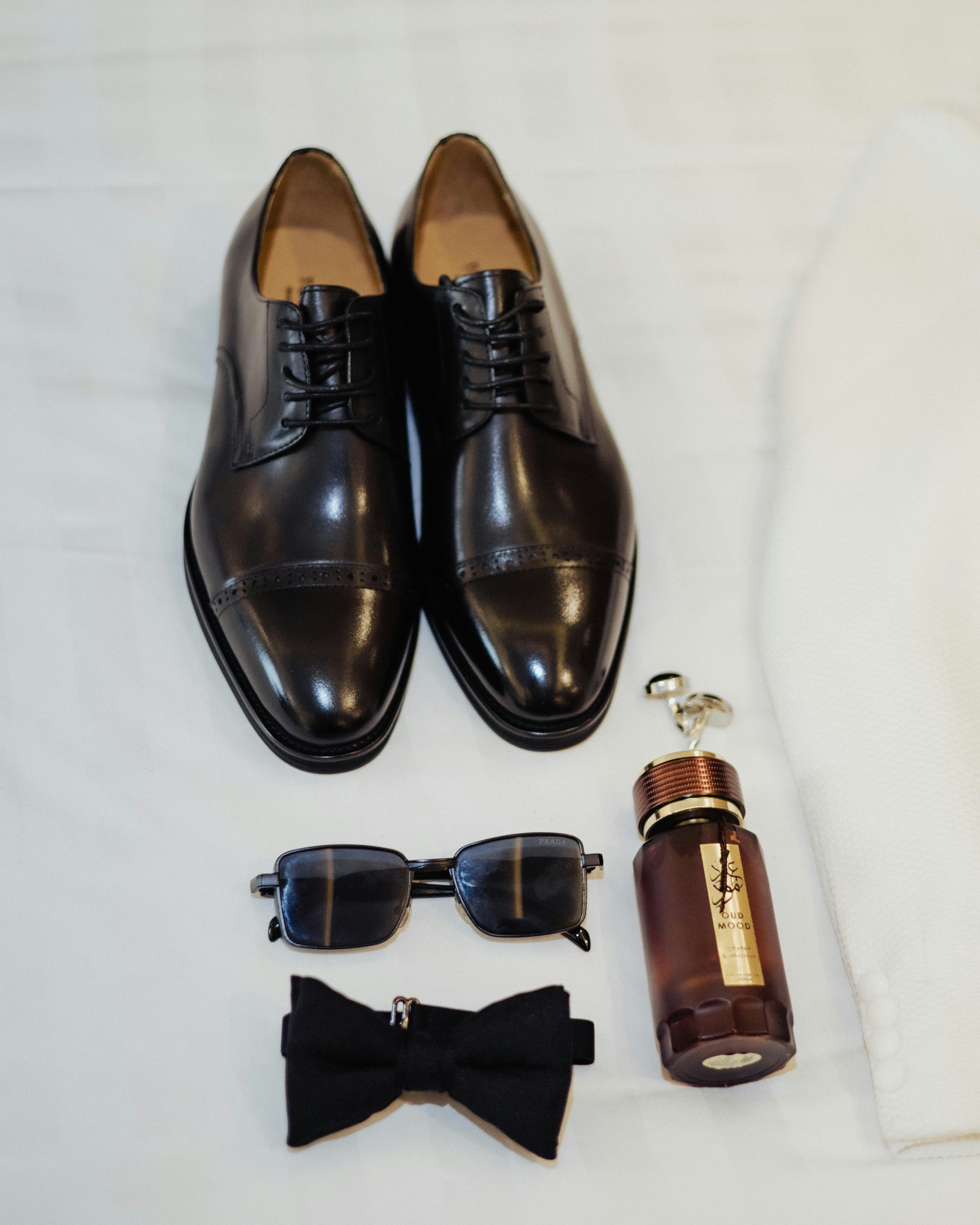 Gentleman’s Essentials: Dress Shoes, Sunglasses, and Scented Distinction