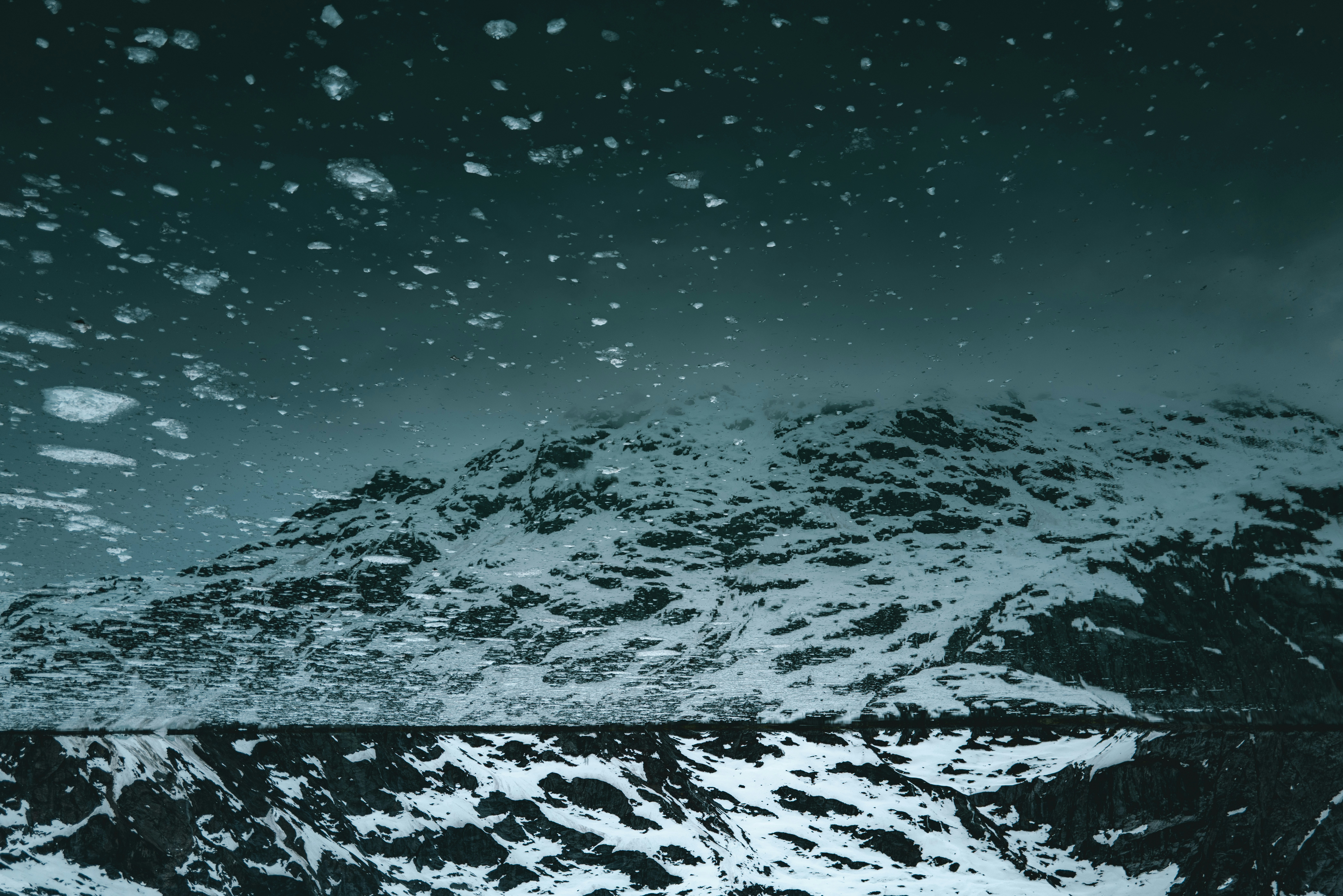 Starlit Ridge over a Snow-dusted Fjord