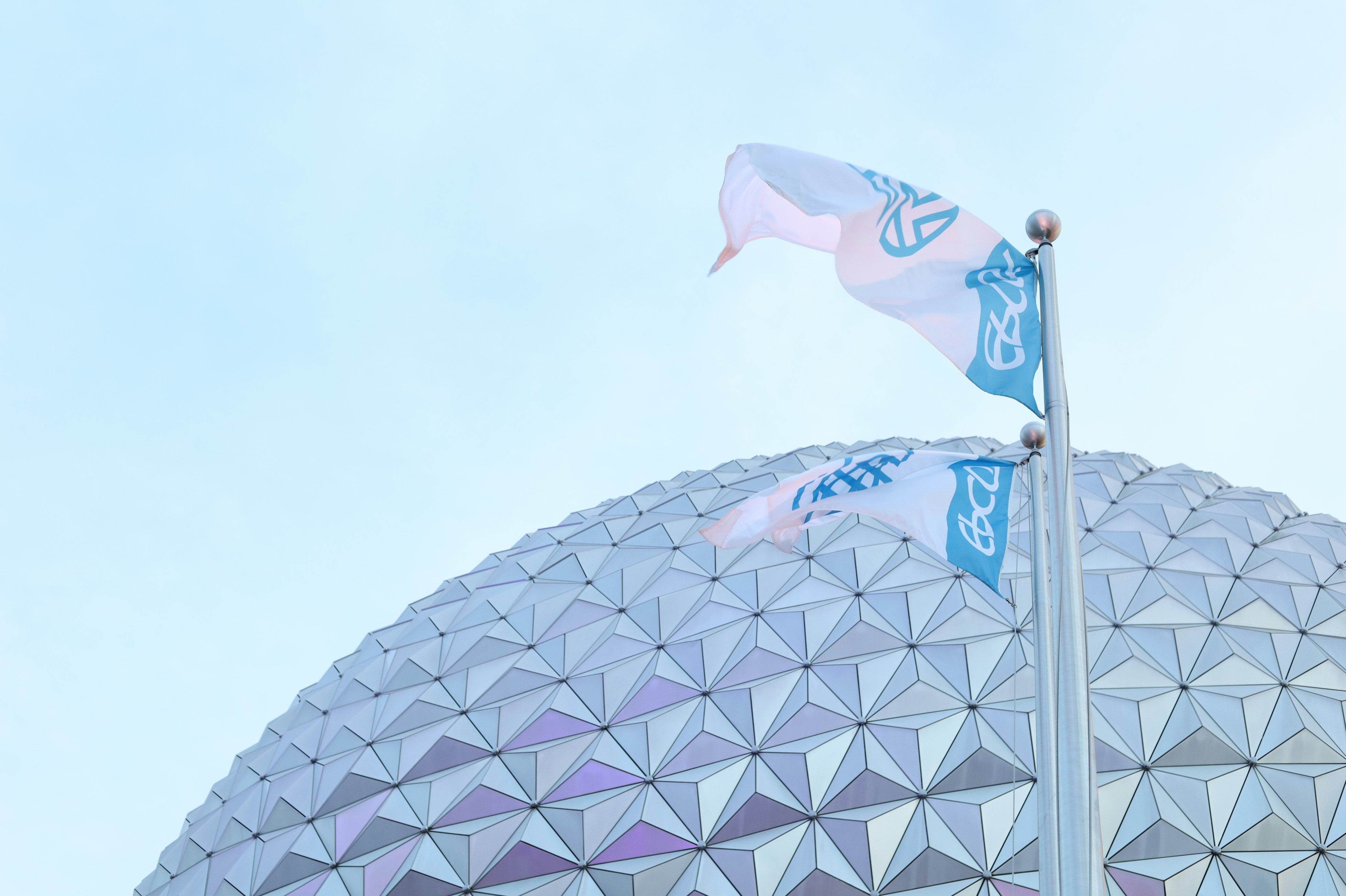 Flagpoles Over a Faceted Dome: Quiet Sunrise at the Iconic Geodesic Sphere