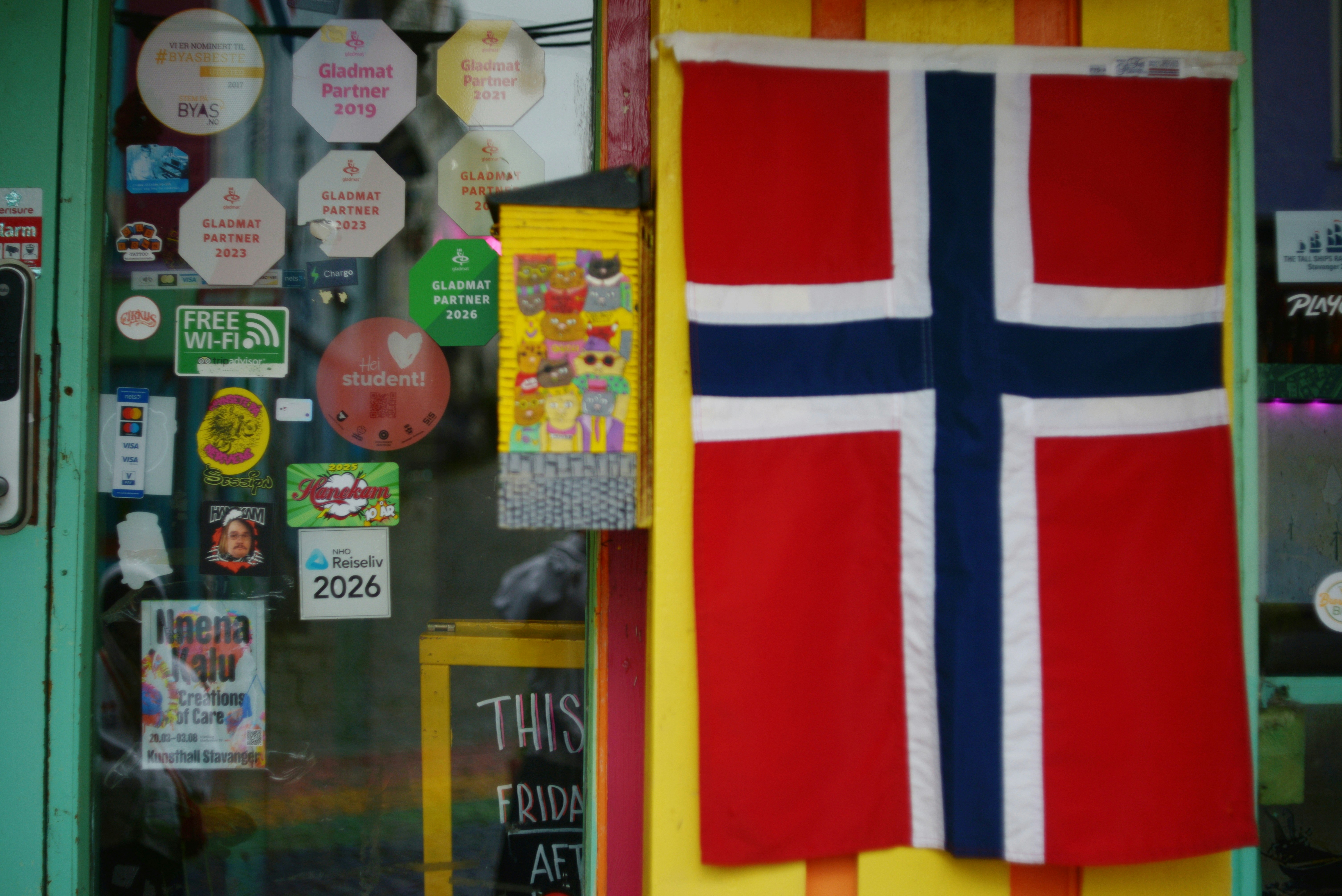 Flag of Norway Adorns a Bright Shopfront Window