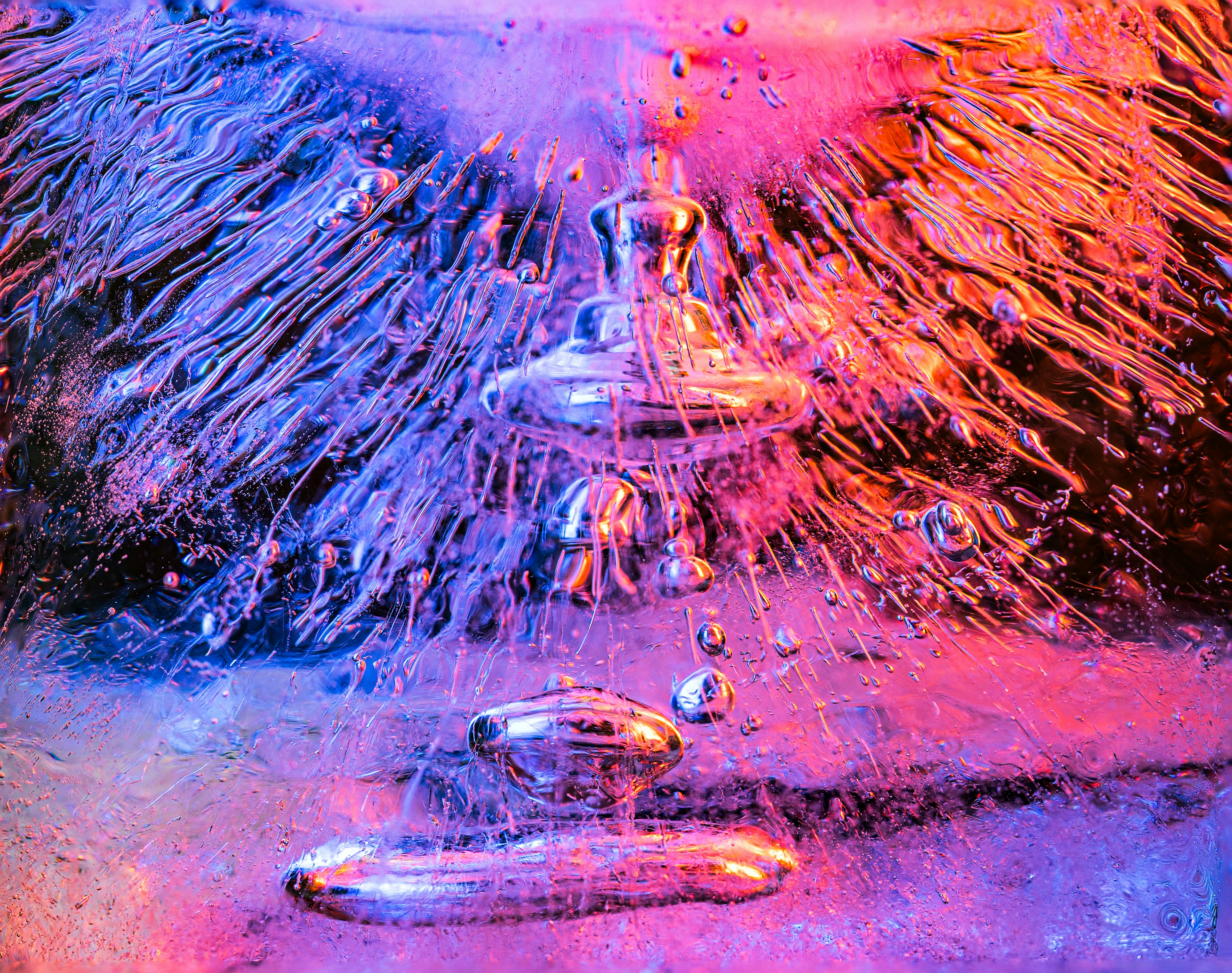 Iridescent Cascade: Frozen Splash Under Neon Light