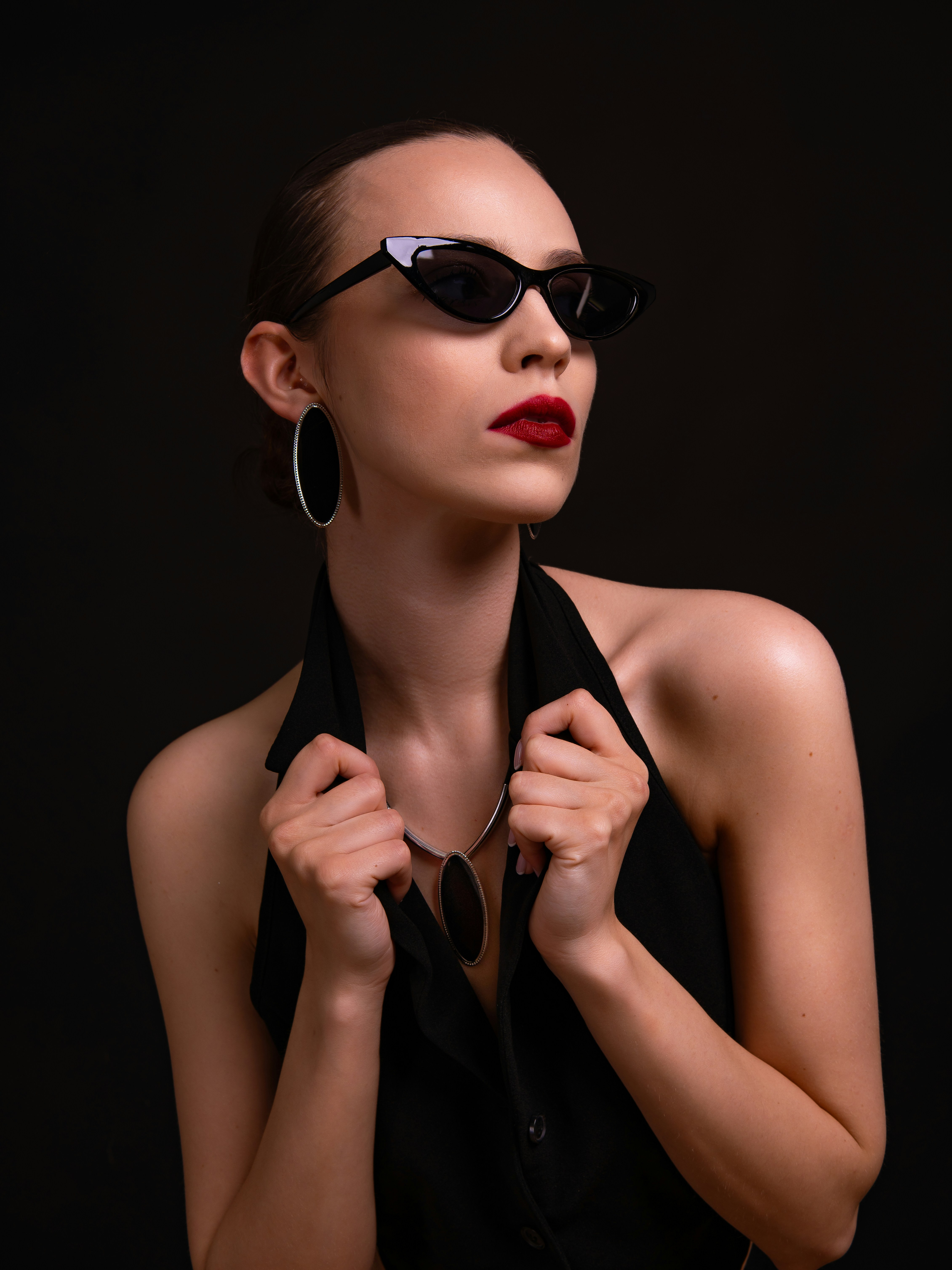 Velvet Noir: A Glimmer of Confidence in Sunglasses