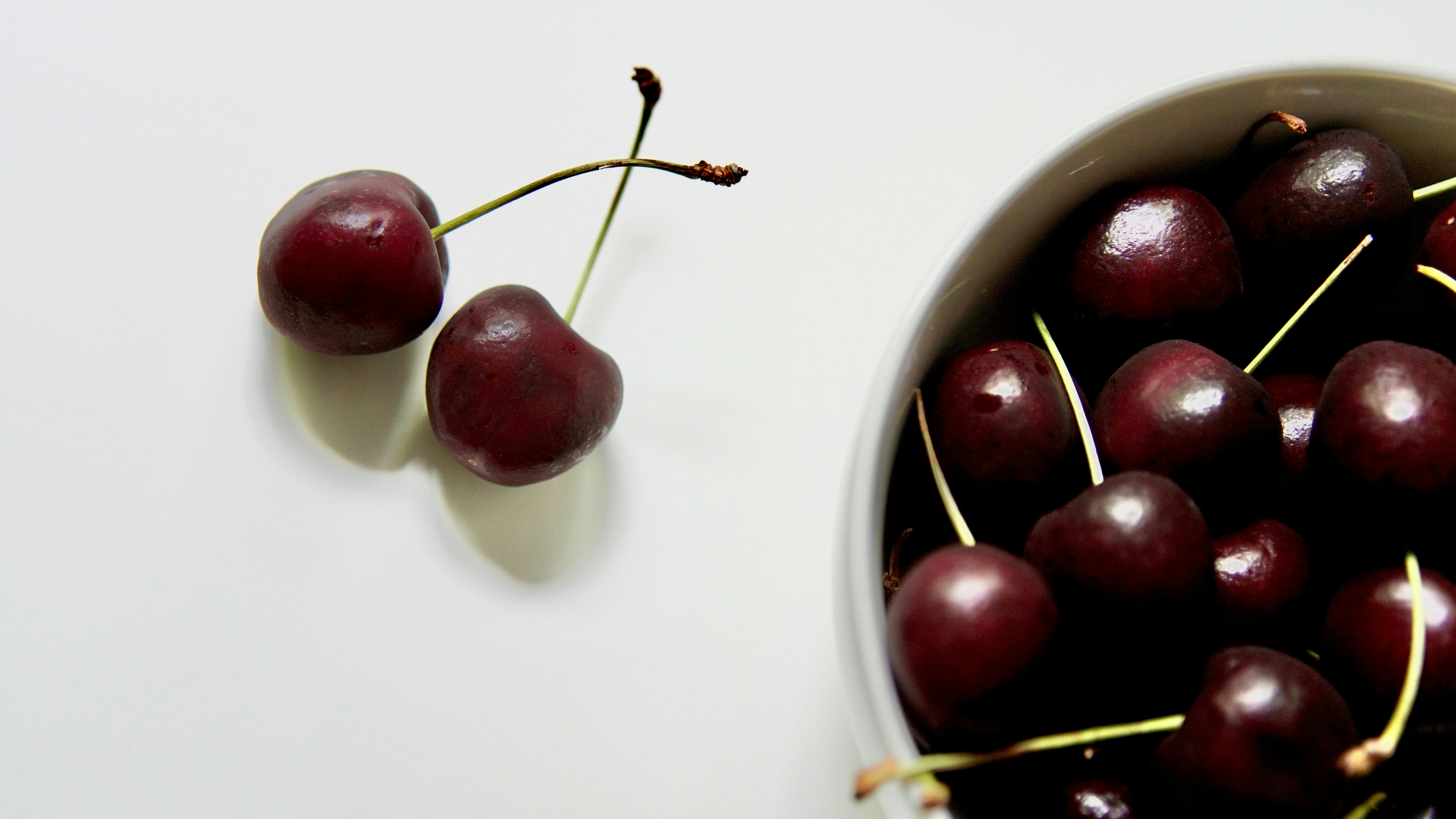 Cherry Pairings on White: A Minimal Still Life