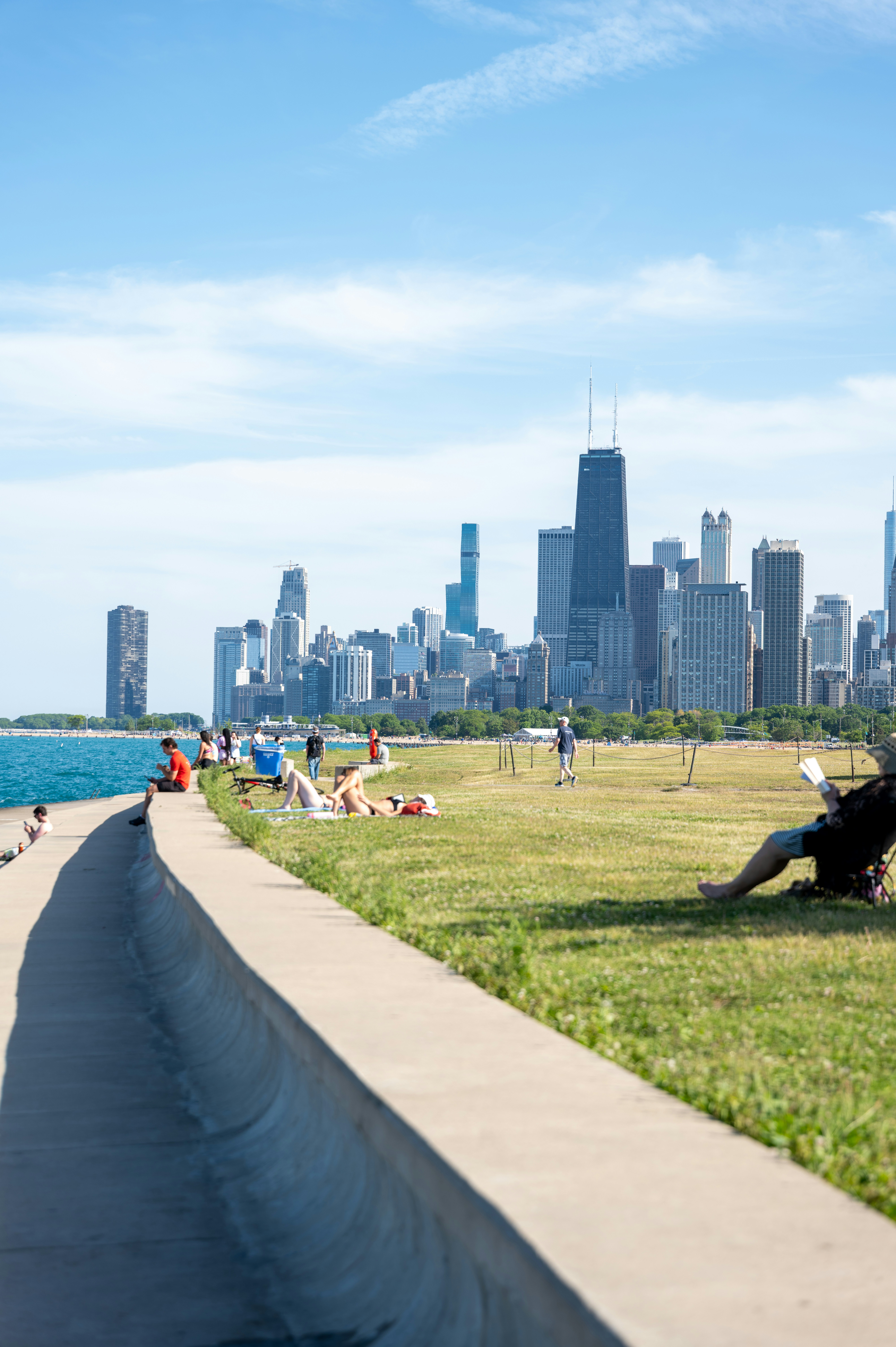 City by the Lake: A Sunlit Promenade Against Skyscrapers