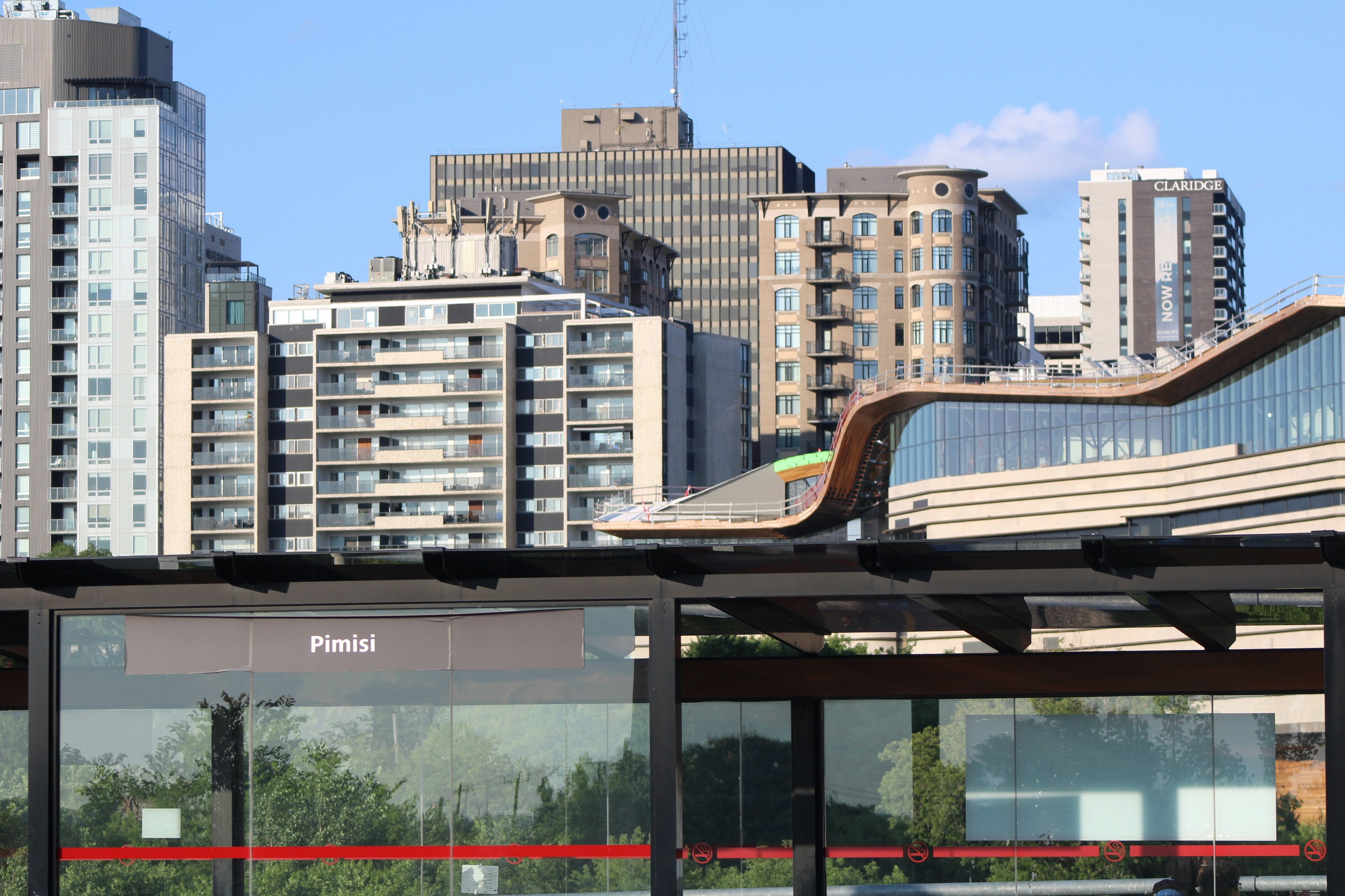 Cityscape Corridor: Glass, Steel, and Sunset Reflections