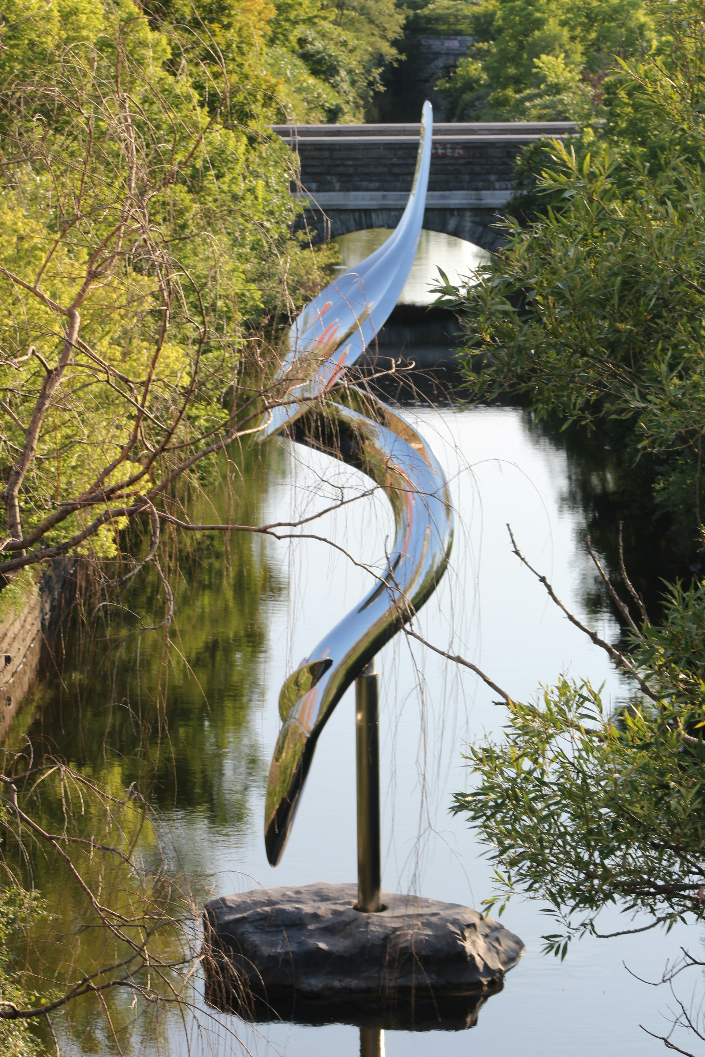 Sinuous Glass Form in a Narrow Waterway
