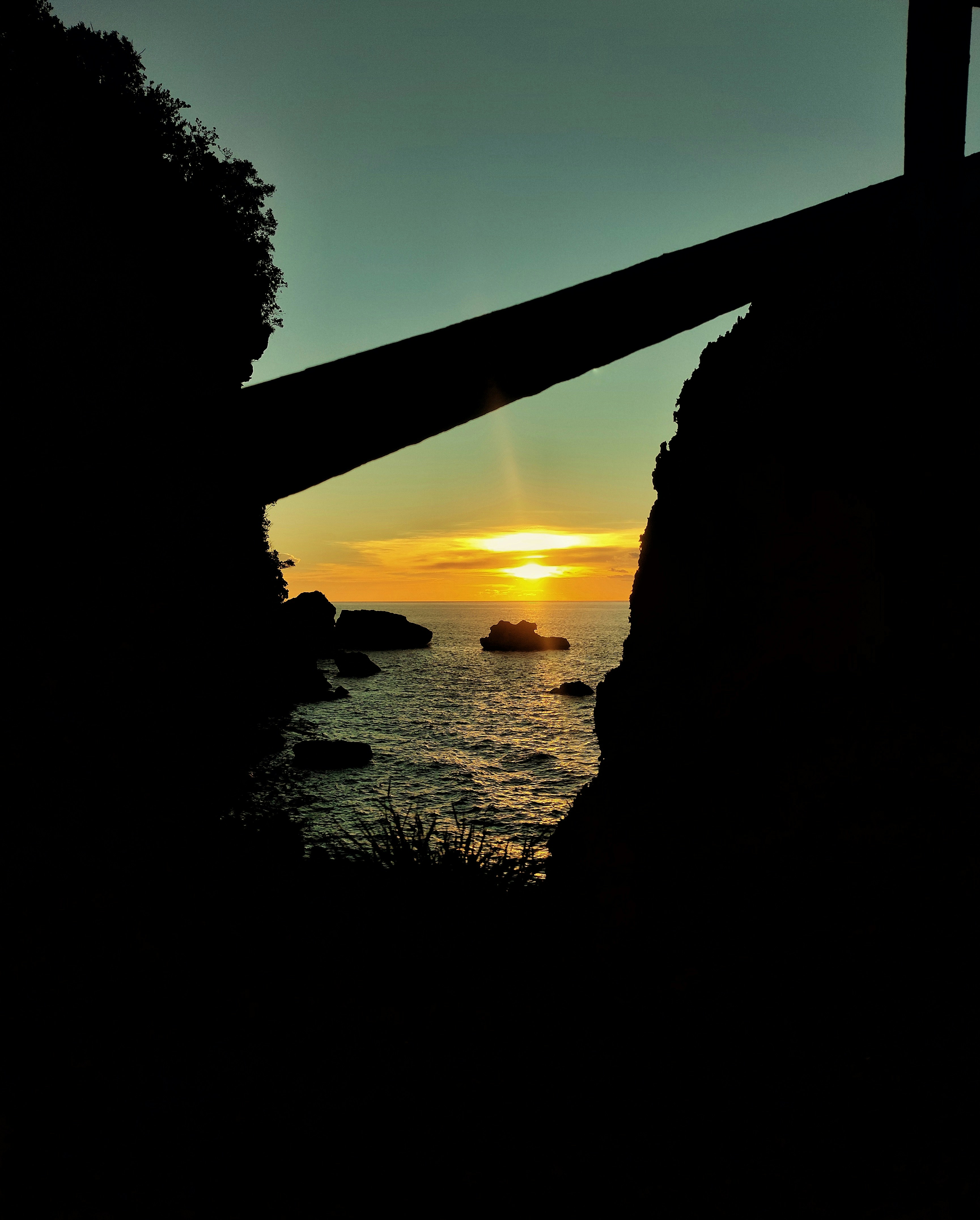 Sunset Between Shadowed Arches