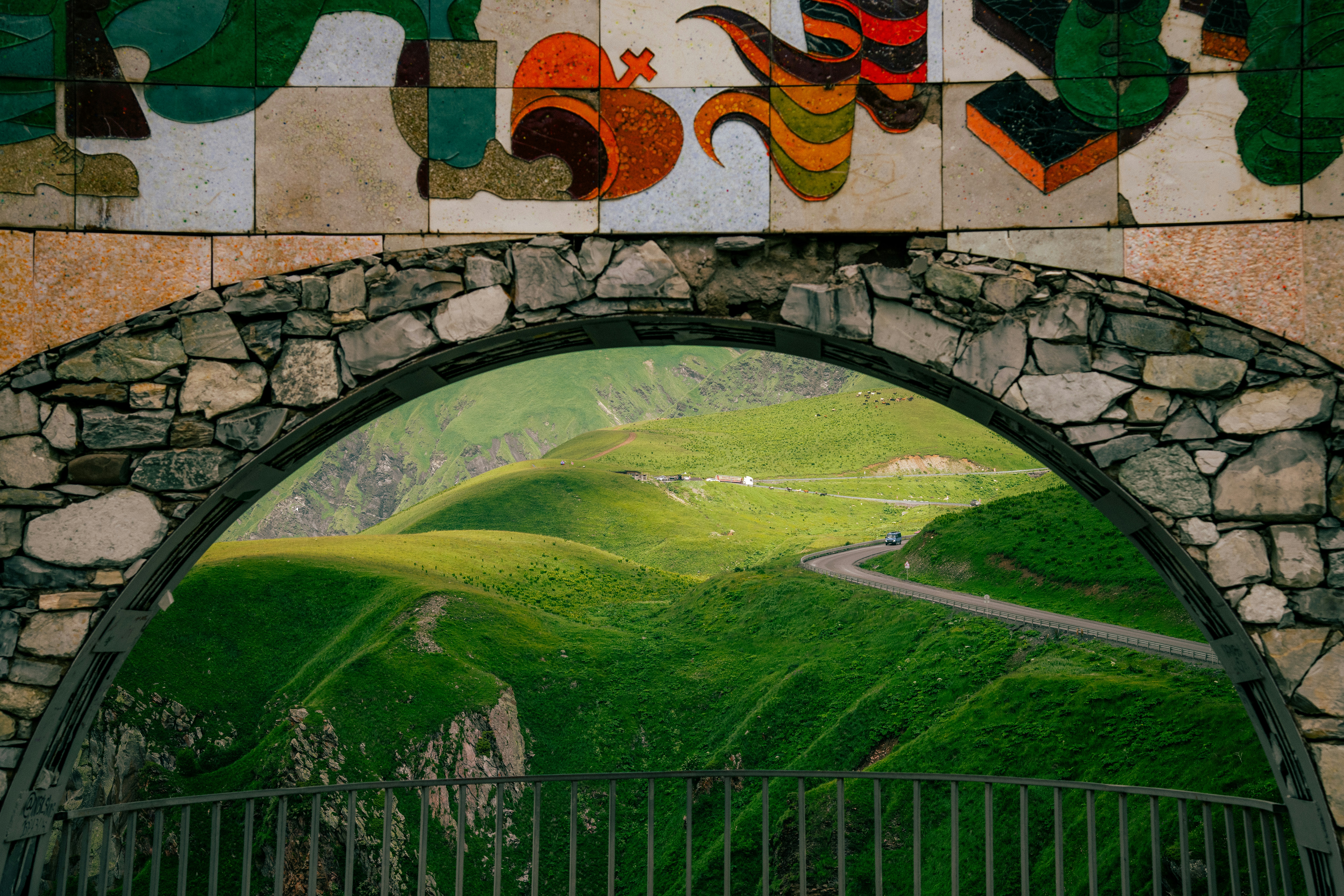 Green Arc: A Circular Window into Rolling Alpine Dreen