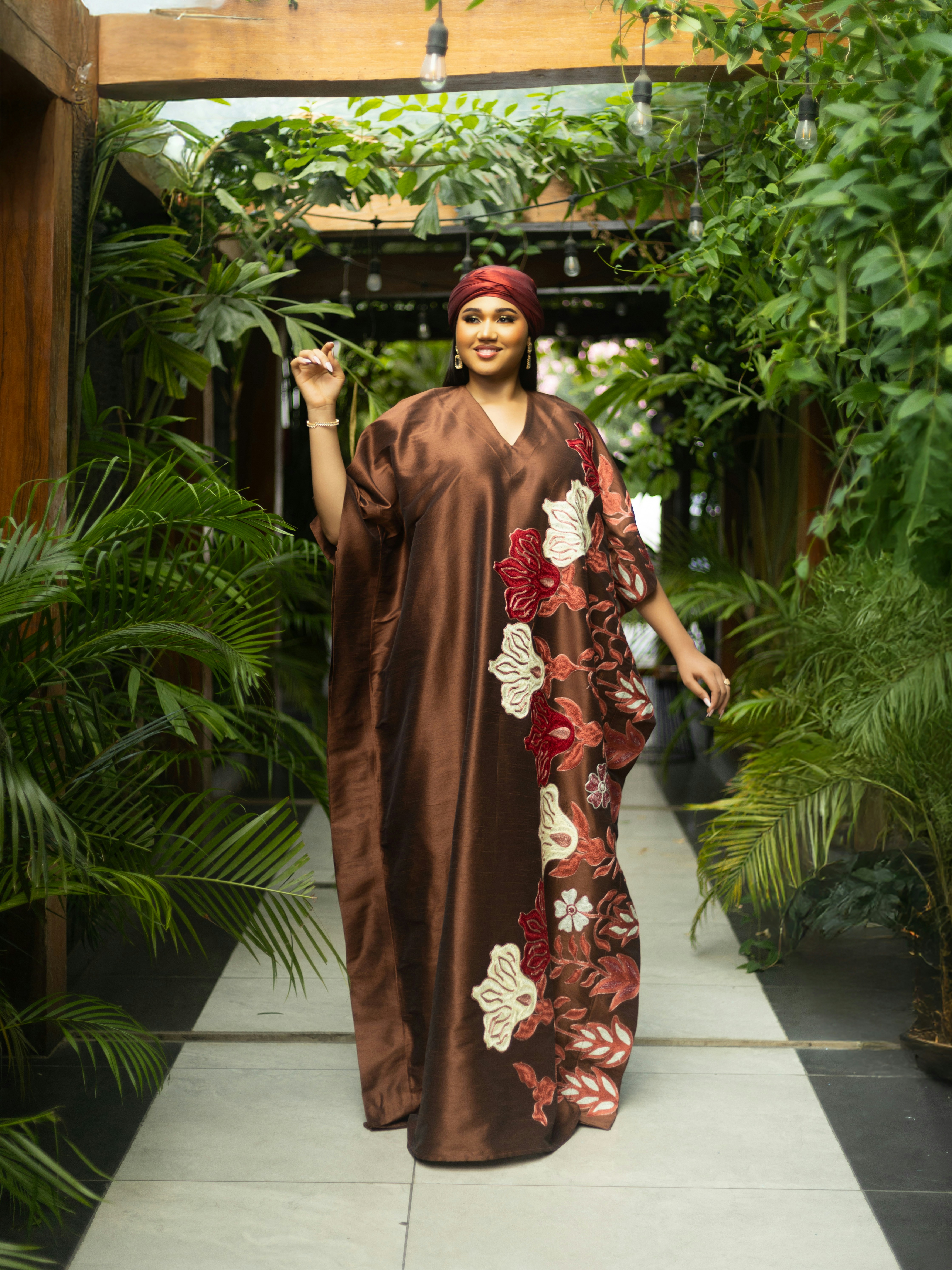 Grace in Silk: A Portrait Amid Tropical Archways