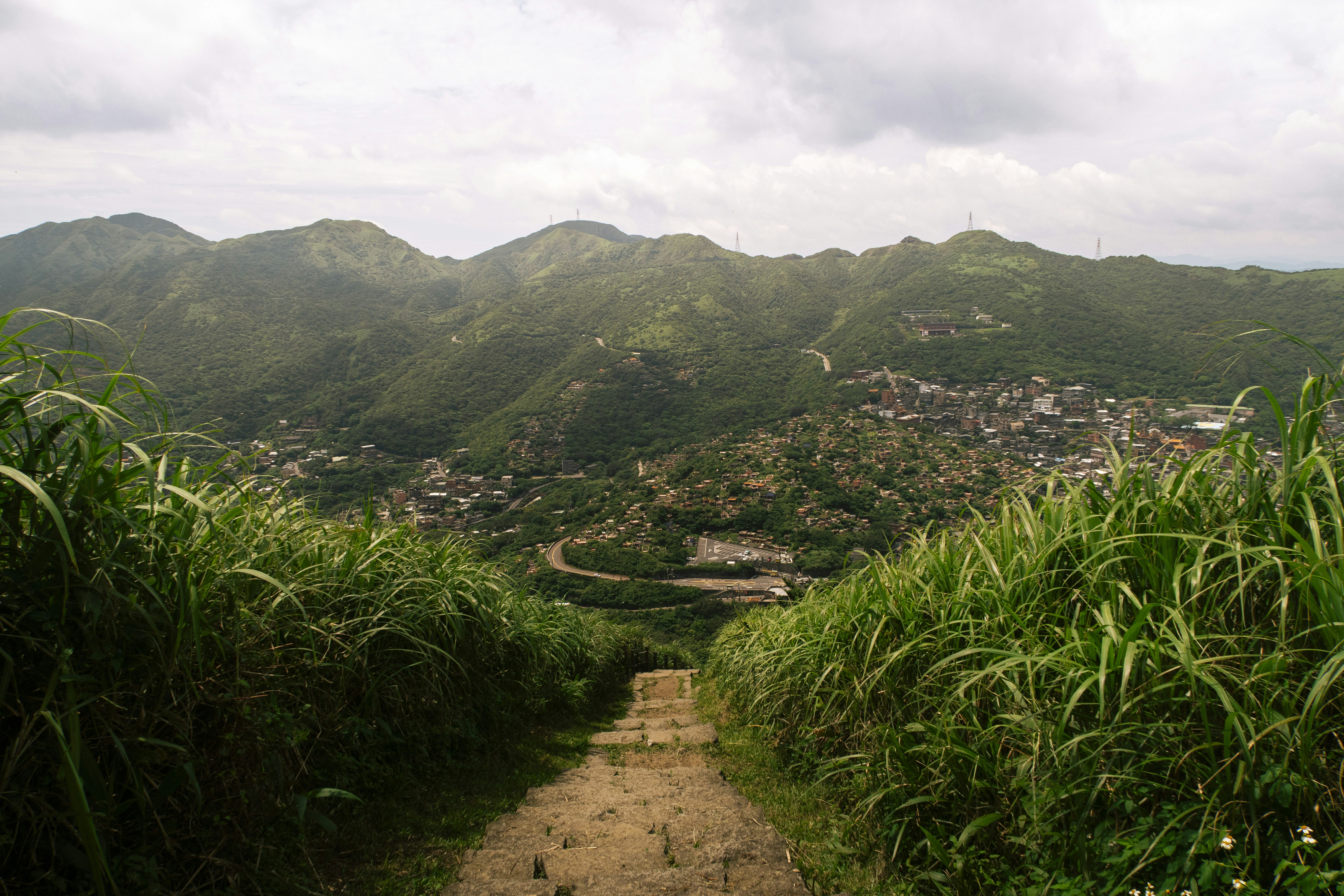 Horizon Staircase: A Trek Toward the Mountain Town