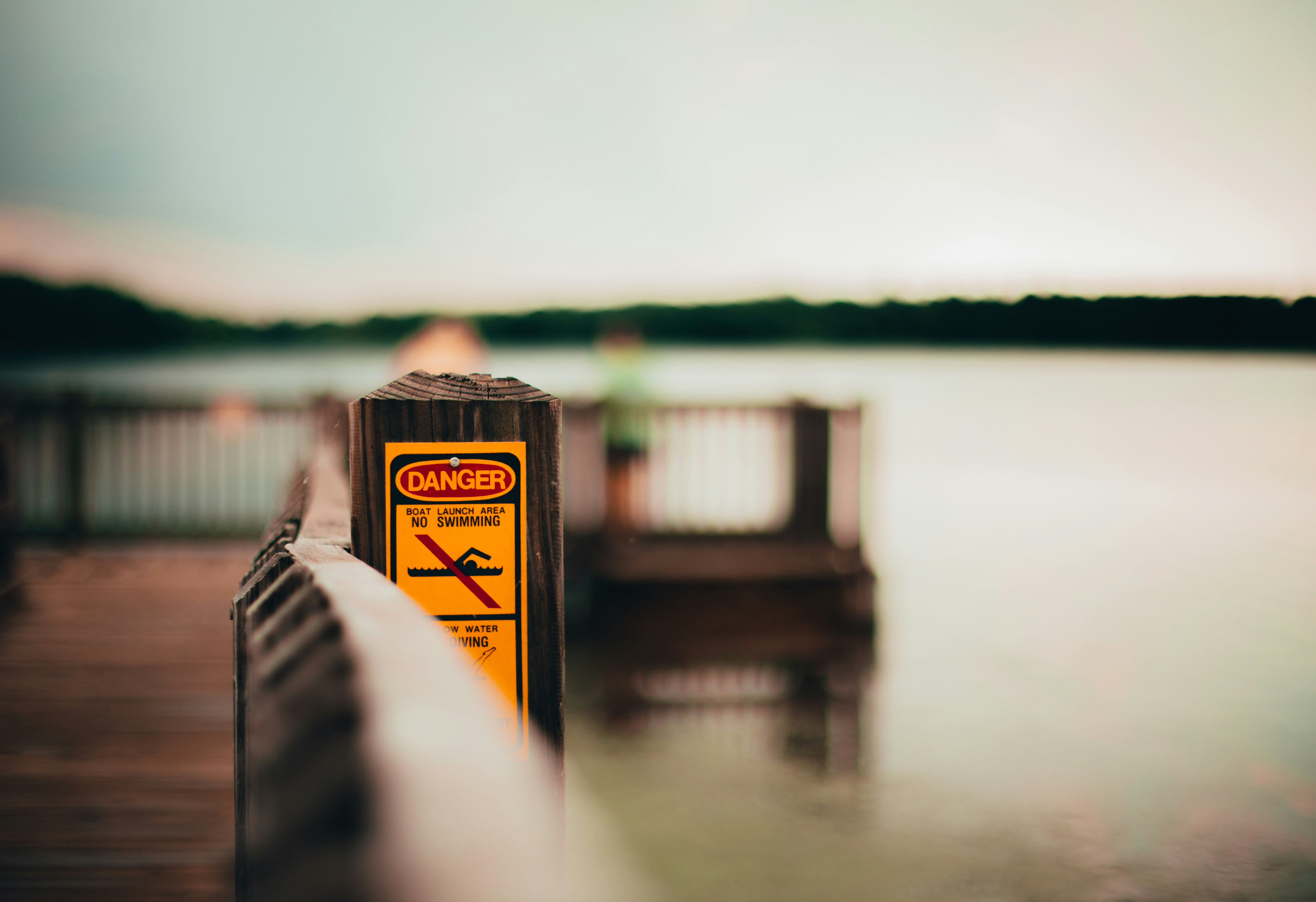 Danger at the Dock: Signposts and Silence on a Misty Pier