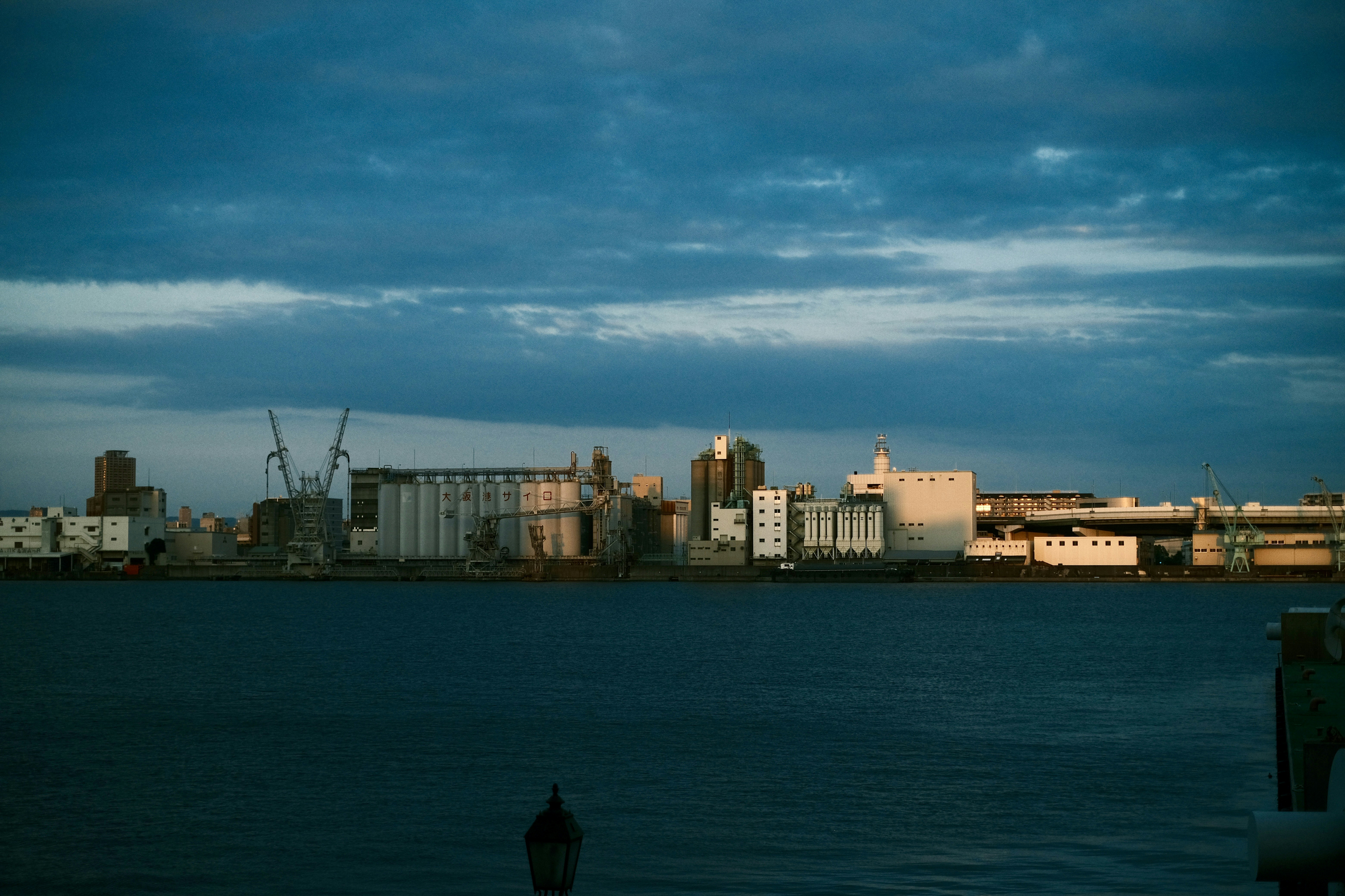 Industrial shoreline at blue hour