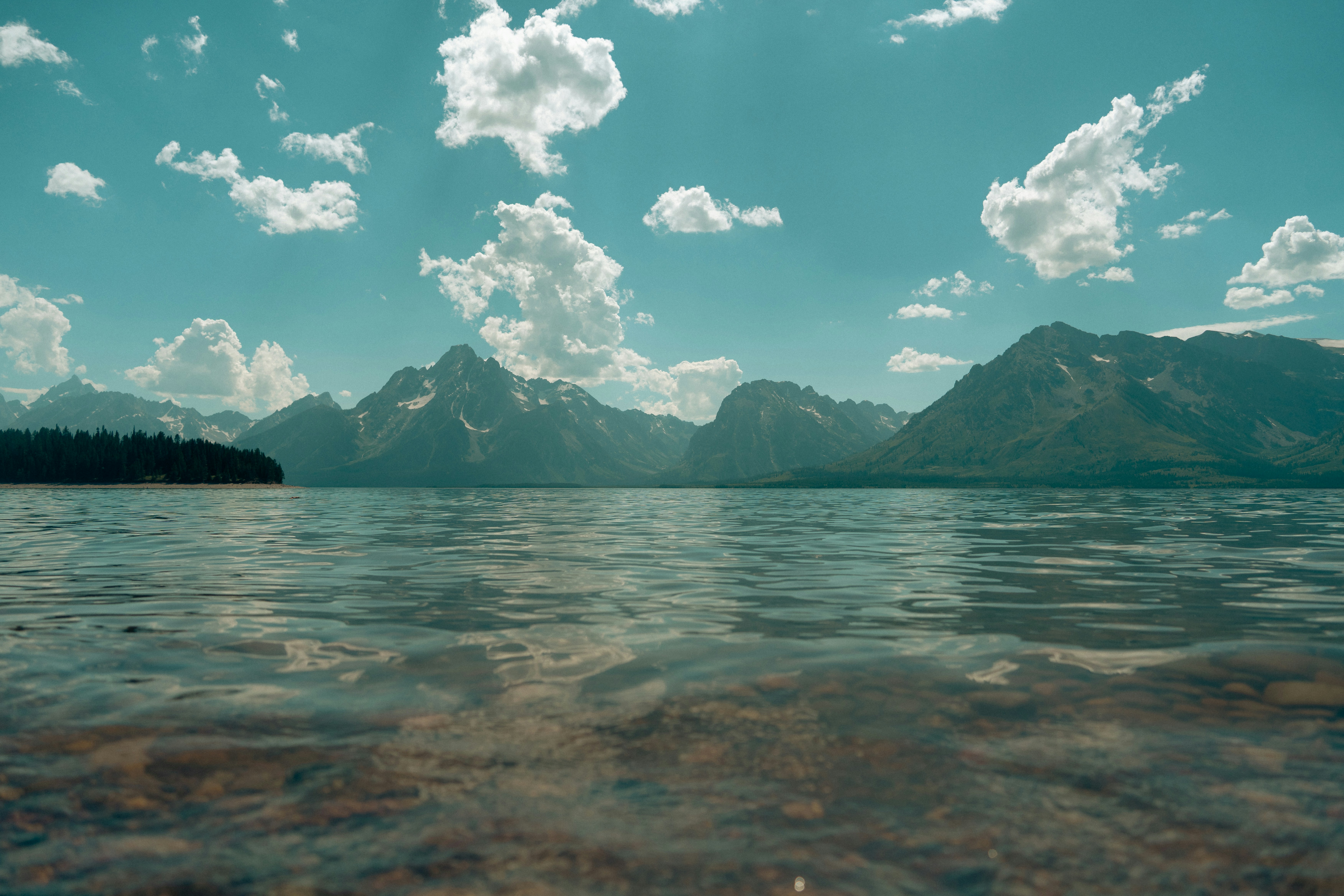 Azure Peaks Over Glassy Waters