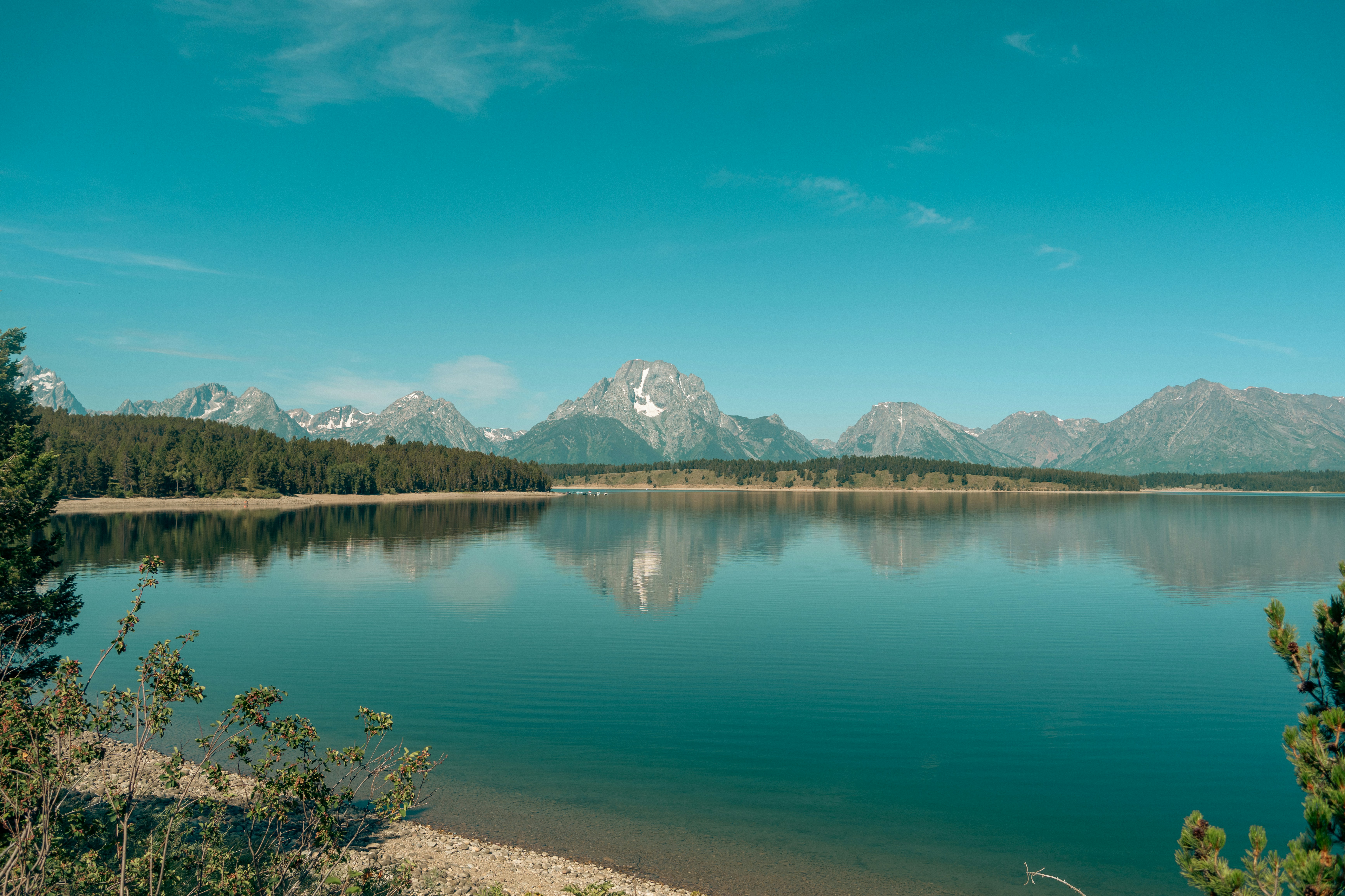 Glacial Peaks Reflected: A Quiet Alpine Lake Panorama