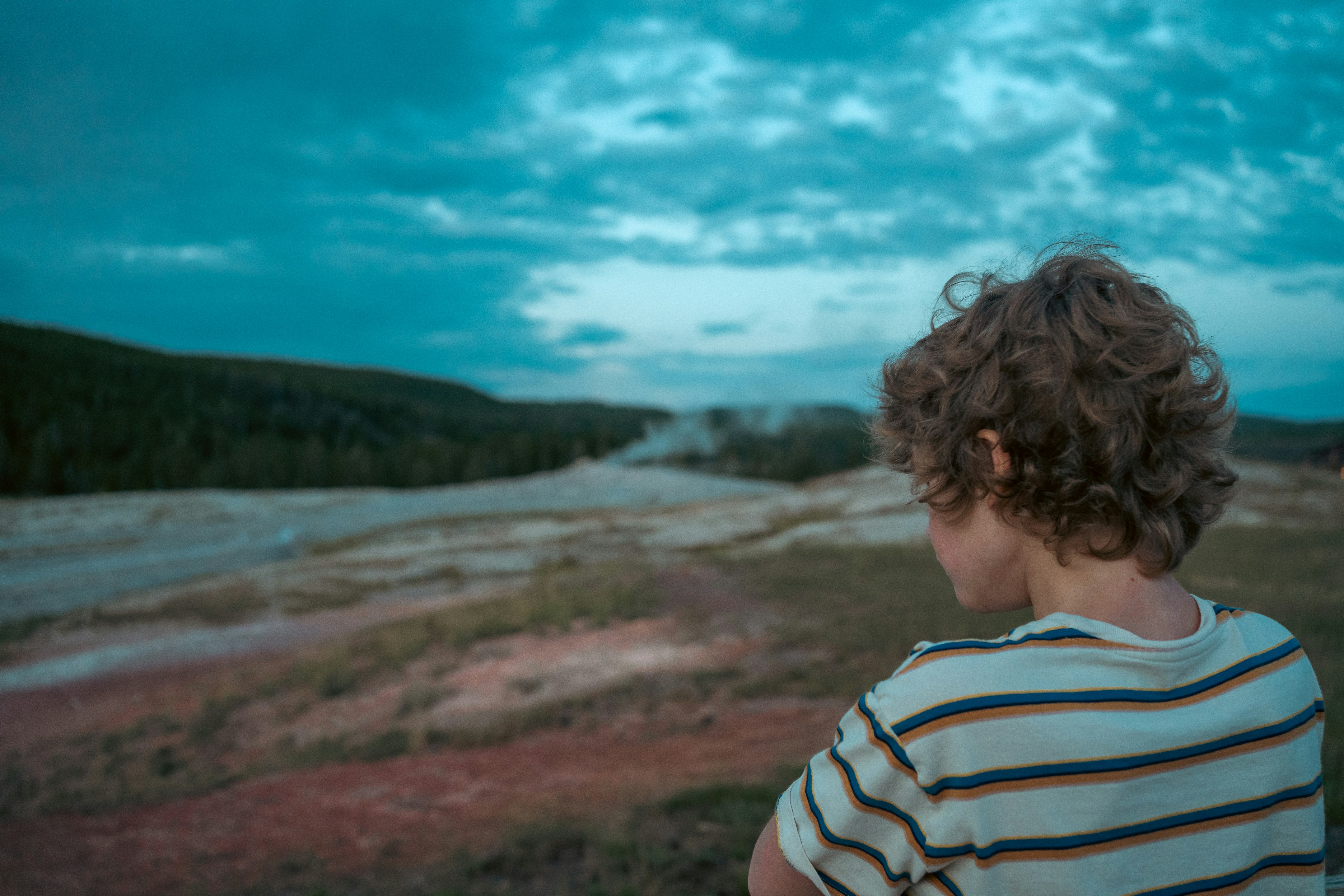 Child at the Edge: Strata of Colored Ground and Horizon