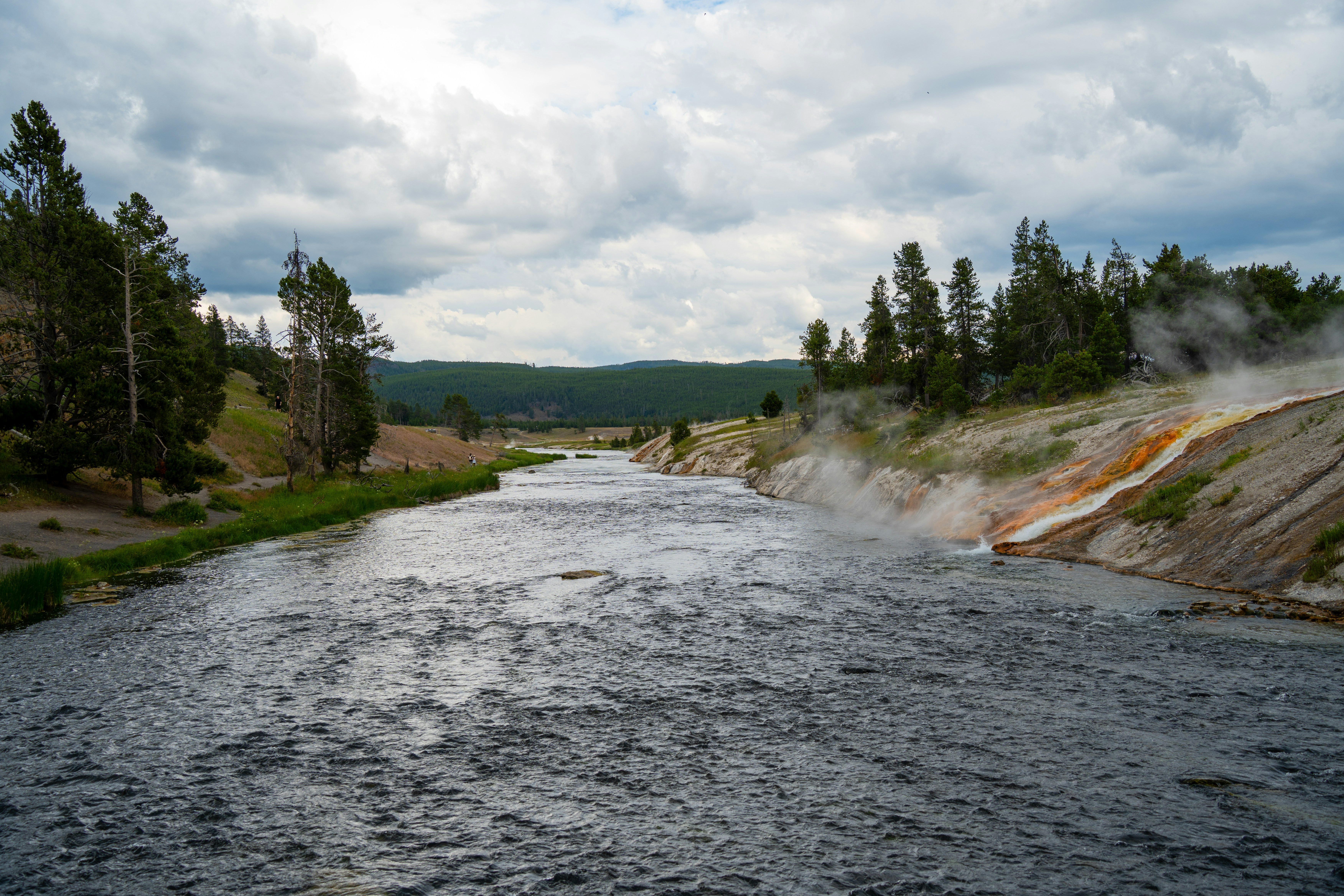 Rifted Riverbanks under a Pressed Sky