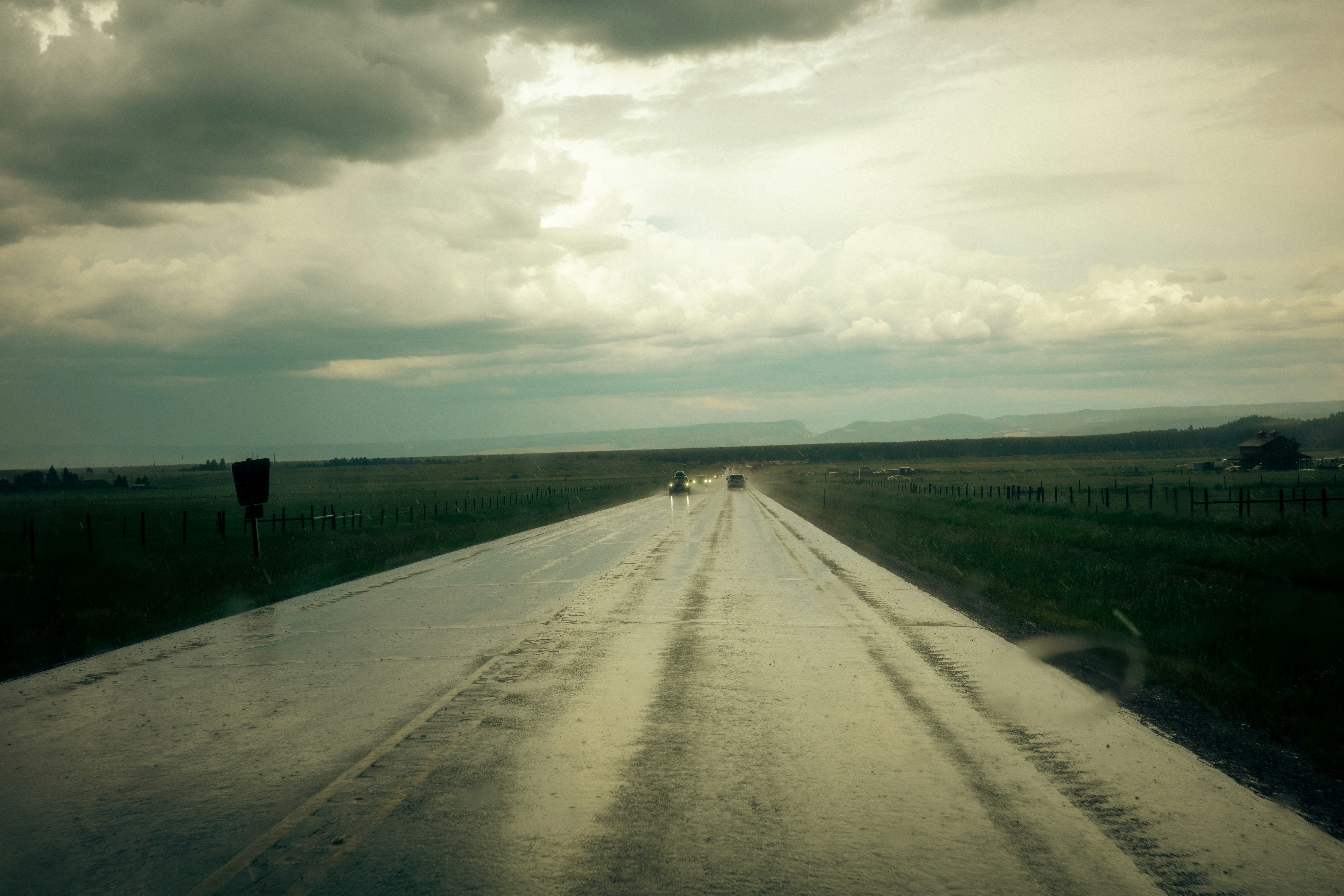 Highway of Light Under Stormy Skies