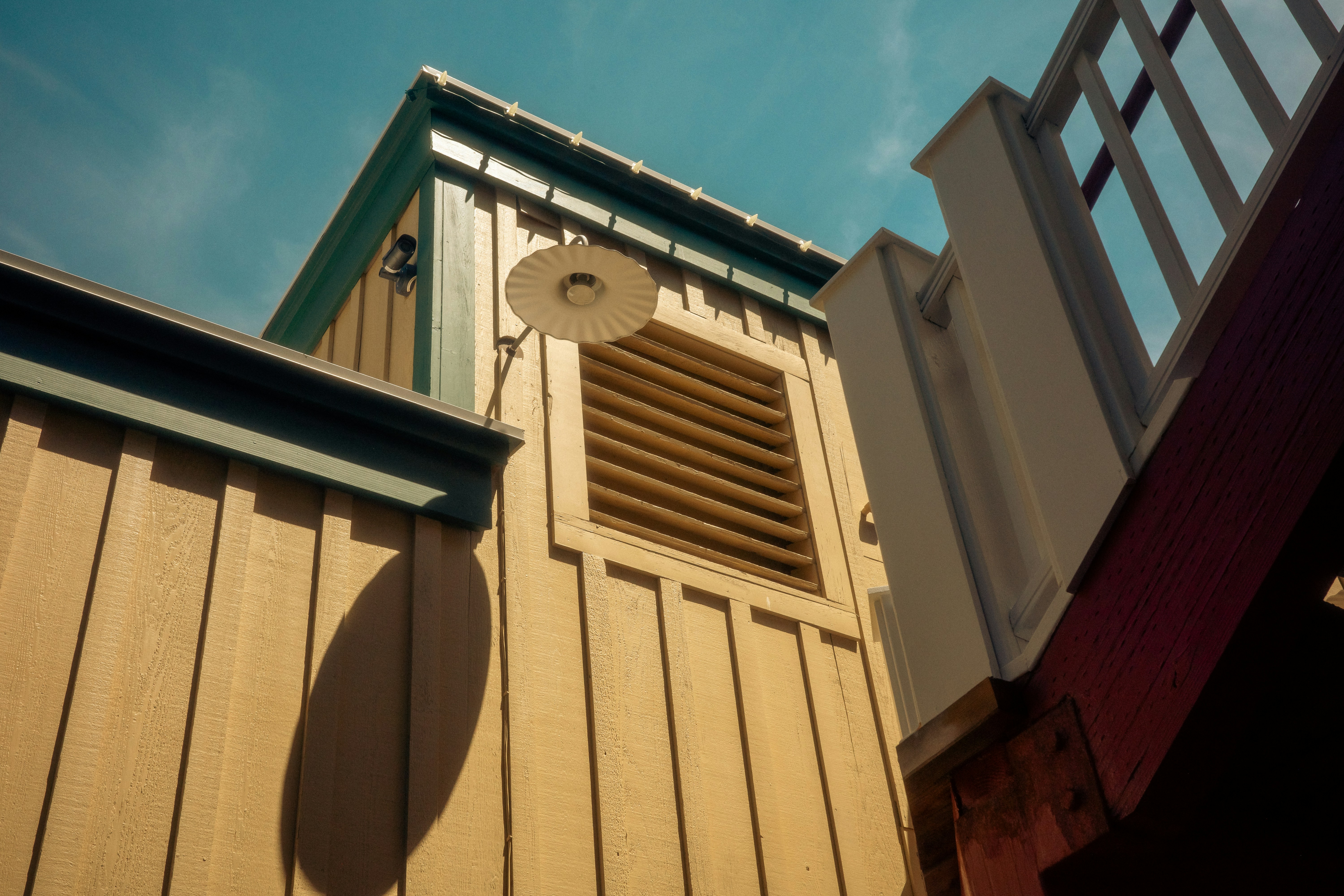 Architectural Facade in Warm Sunlight by the Balcony