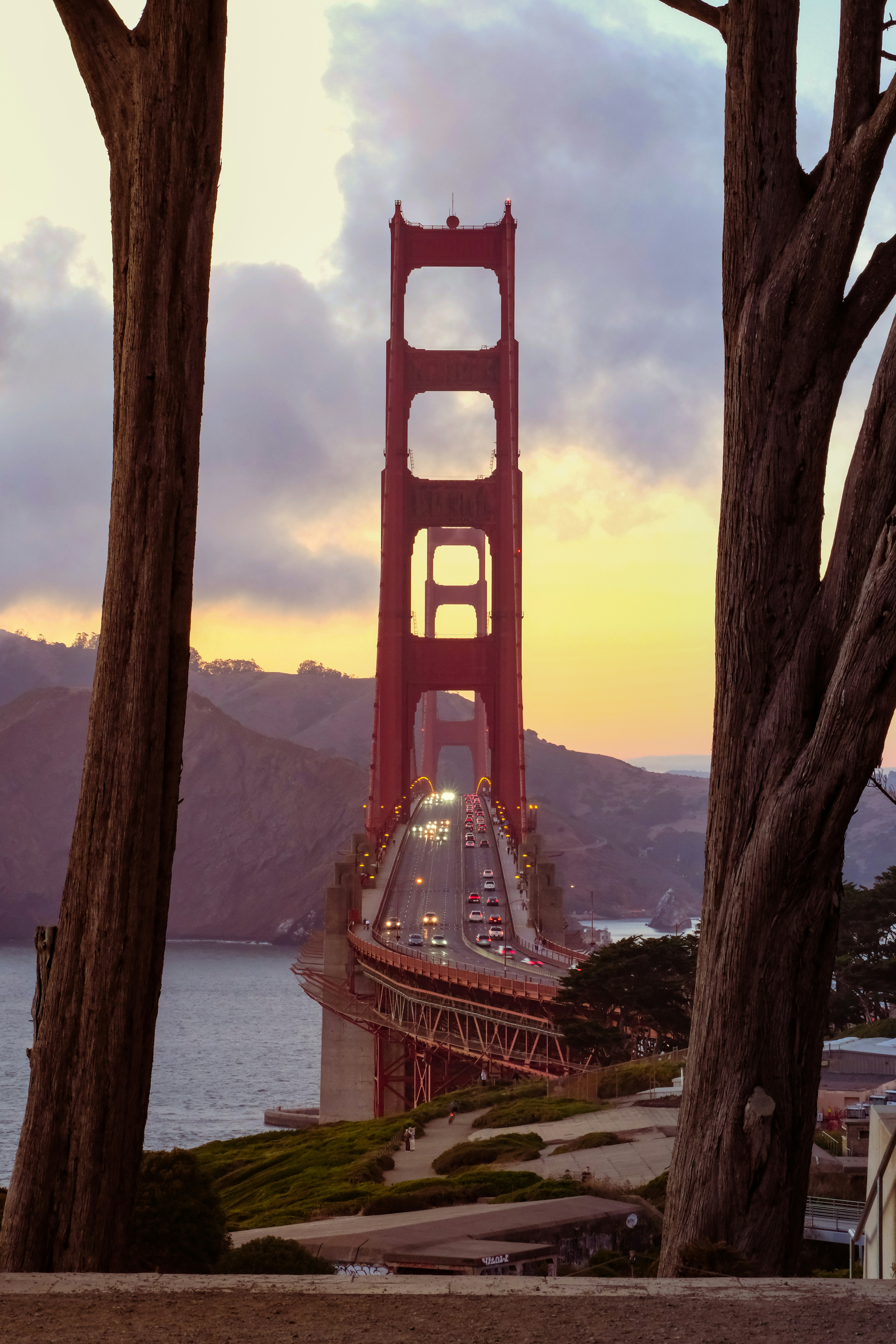 Sunset Gateway: The Golden Tower Framed by Trees