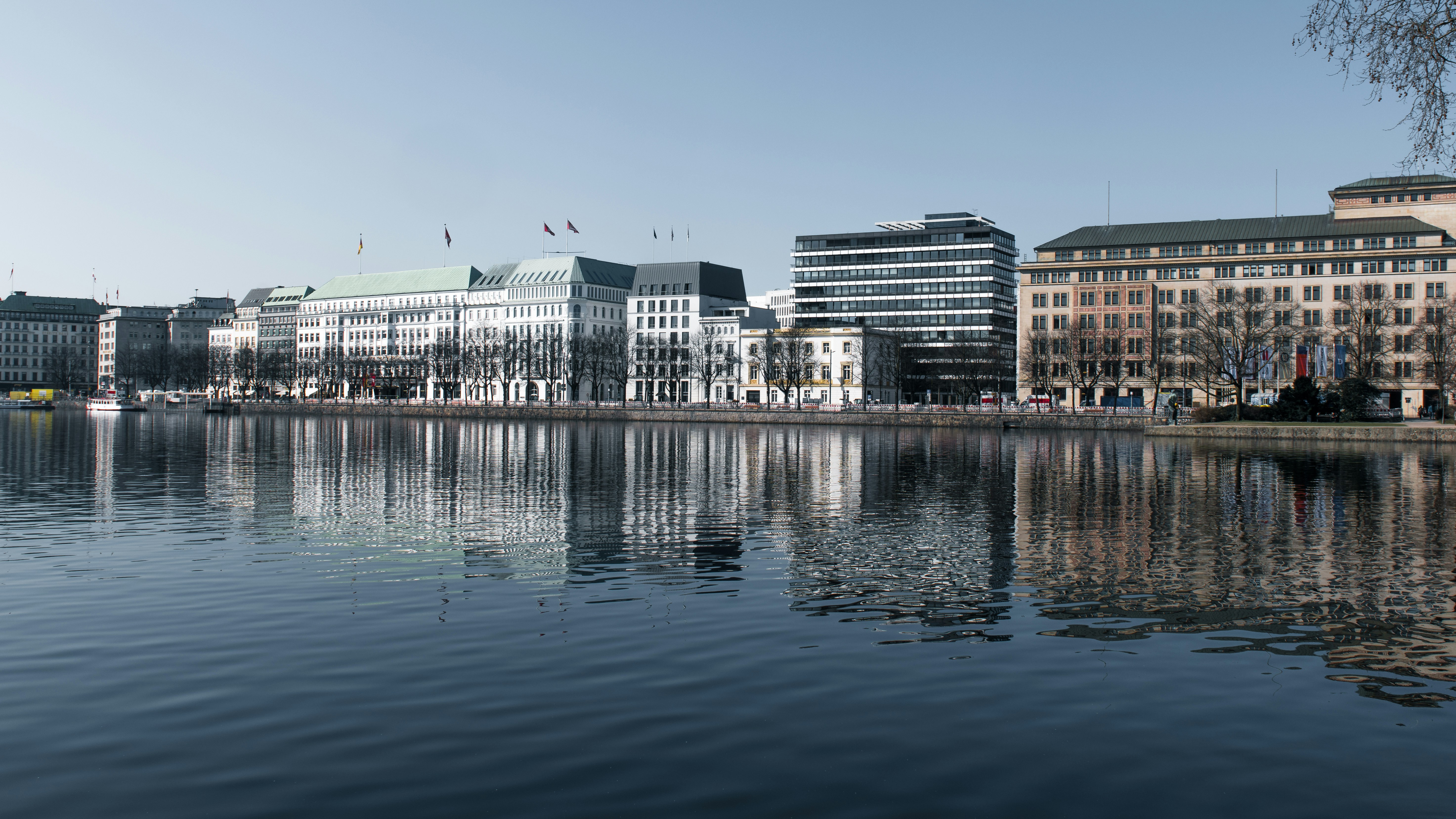 City Reflections Across the Tranquil Riverfront