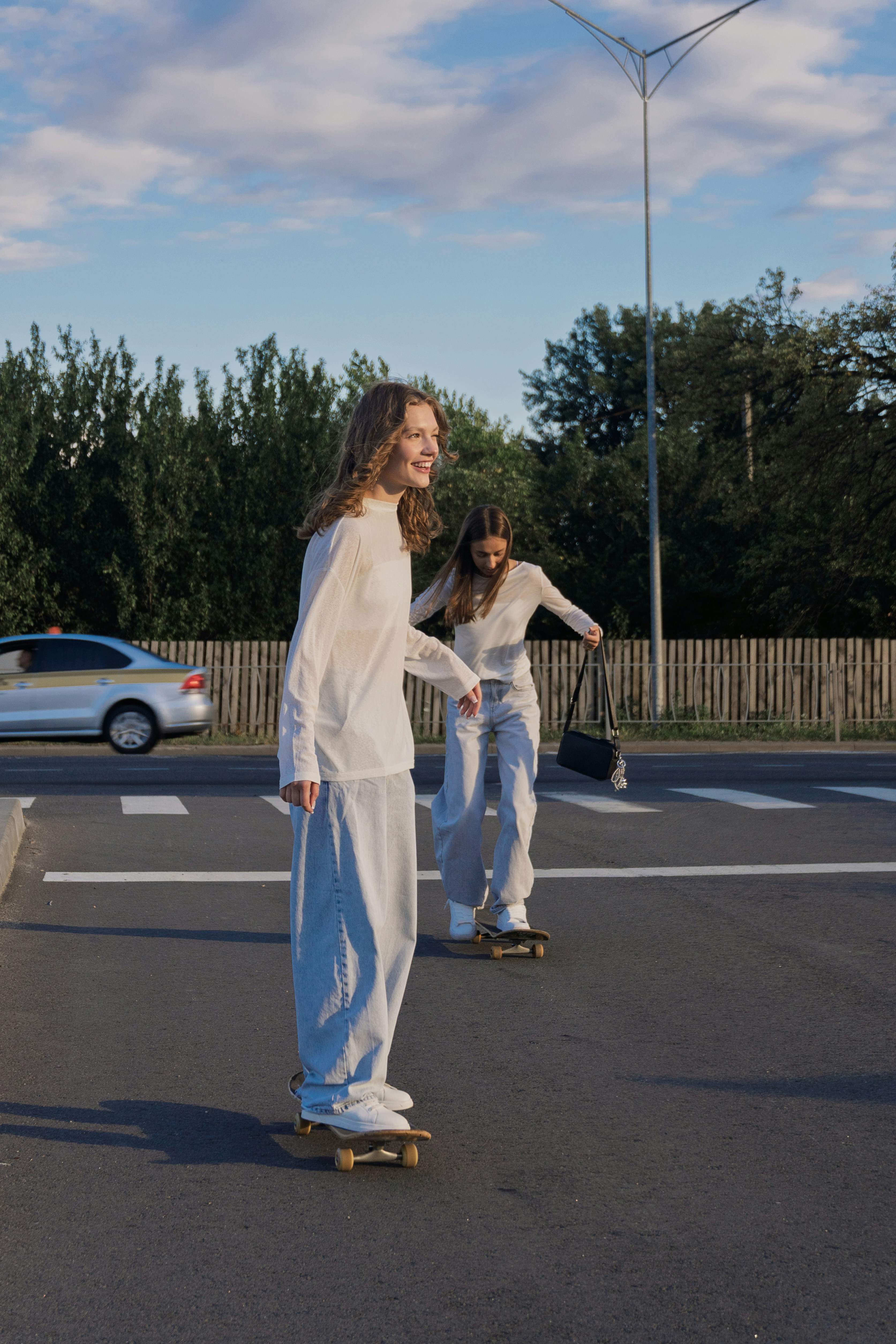Skateboarders in Sync: Evening Street Glide