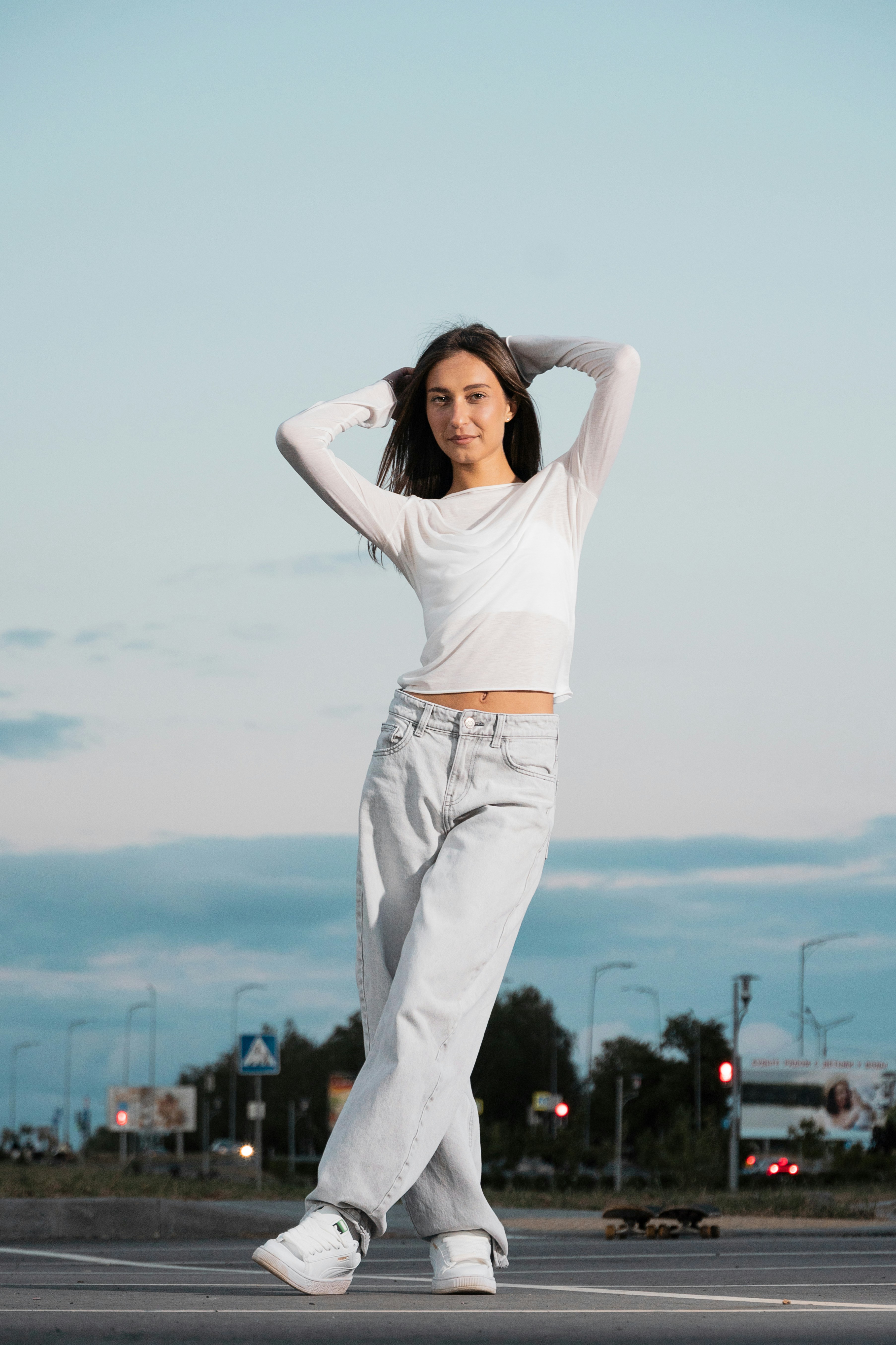 Solitary Poise: A Free-Spirited Portrait in Daylight