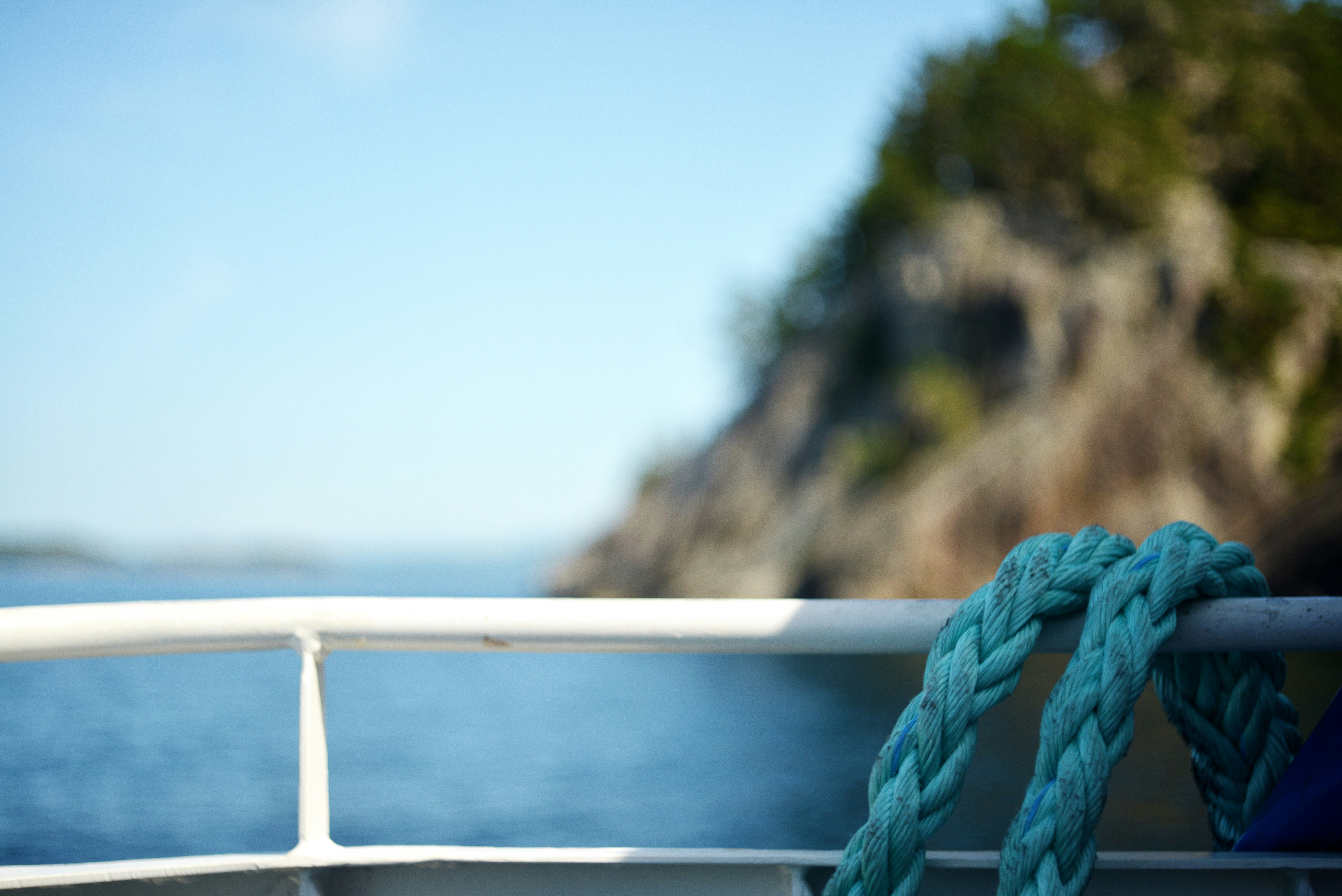 Rope and Rail: Quiet Sea from a Vessel