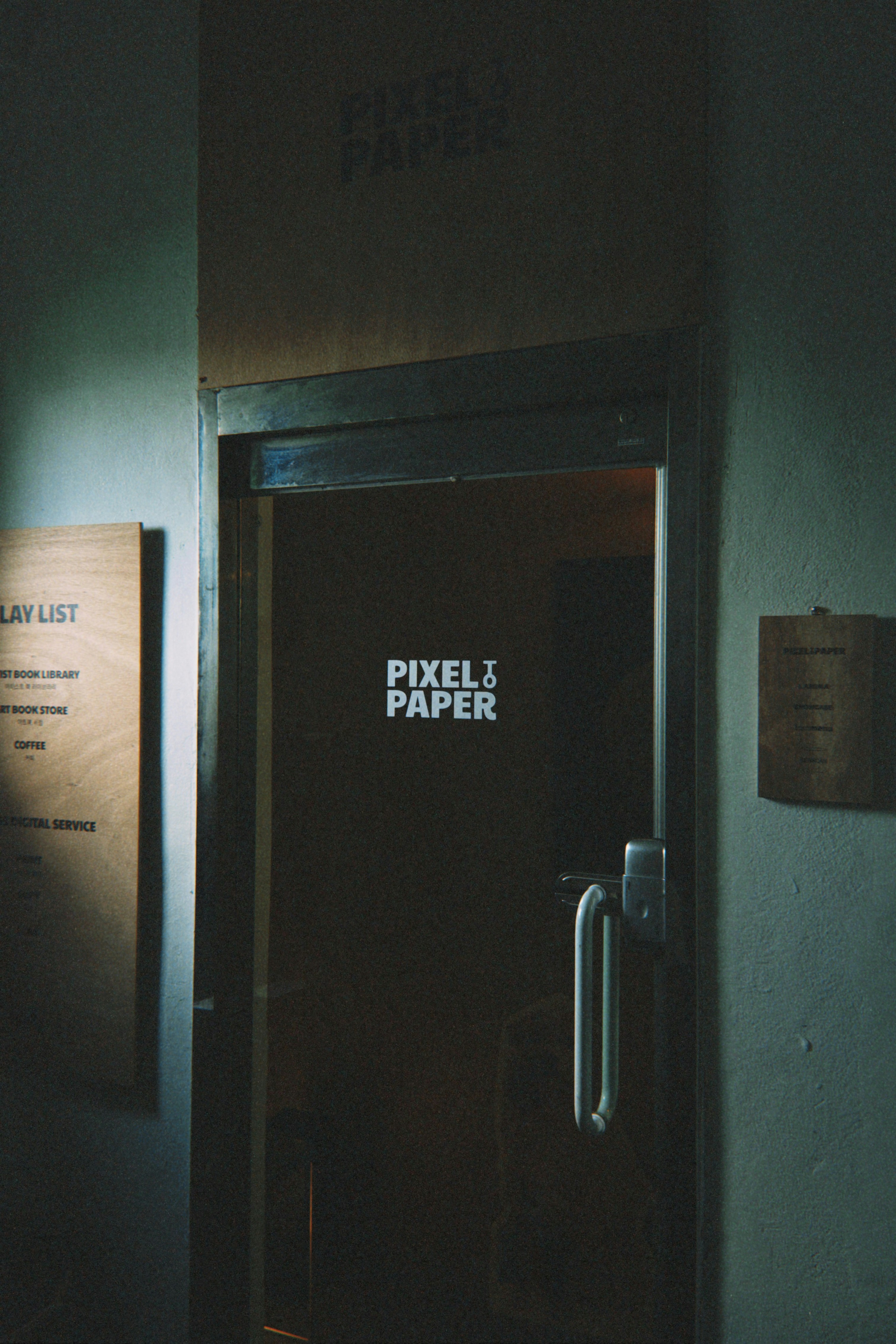 Pixel & Paper: A Dimly Lit Doorway into a Quiet Studio
