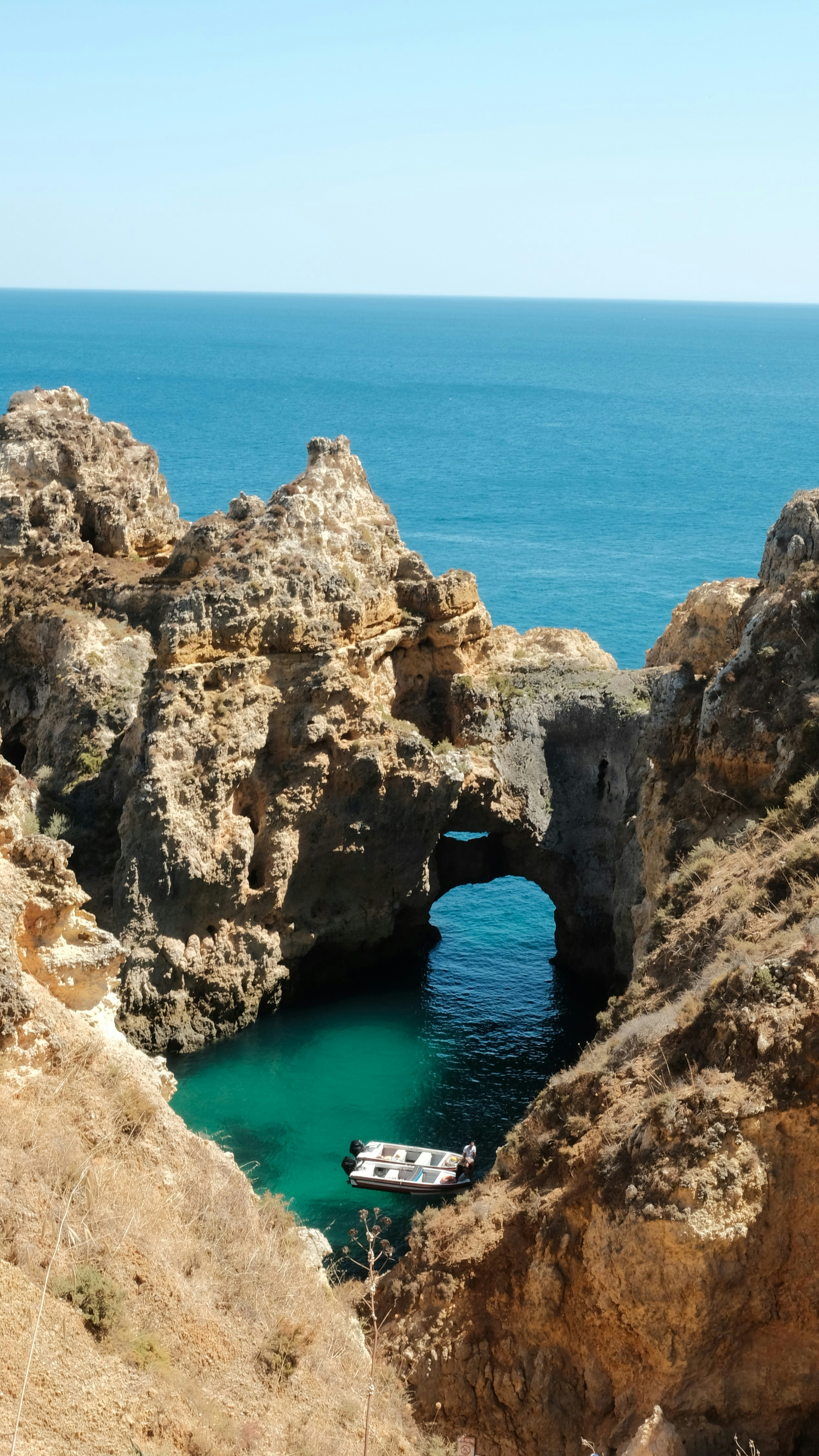 Emerald Cove: A Secluded Arch Carved by Ocean Light