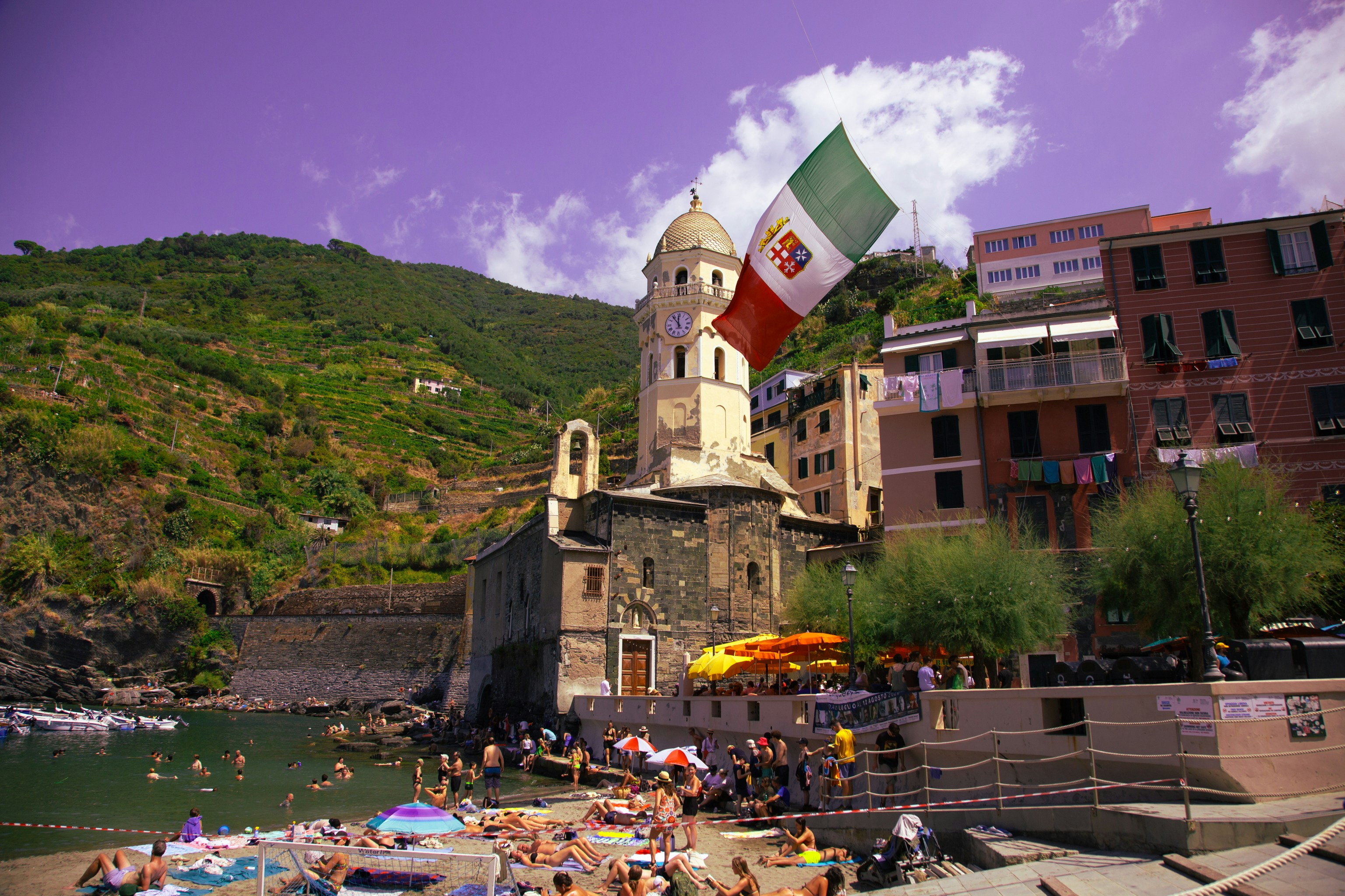 Flag over the Adriatic: a sun-soaked Sicilian harbor scene