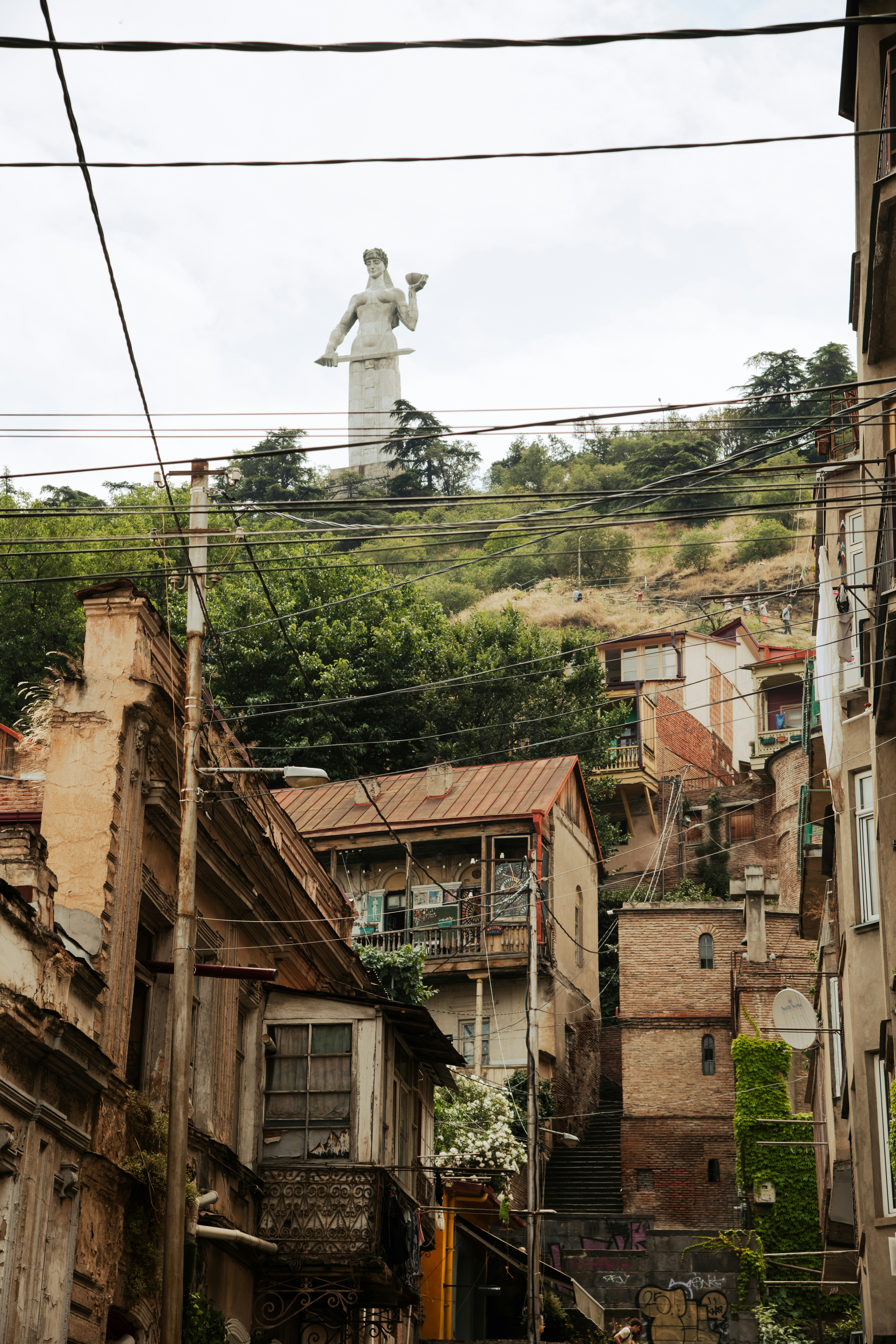 Statue Overlook: A Quiet Hilltop Shrine Above a Woven Urban Borough