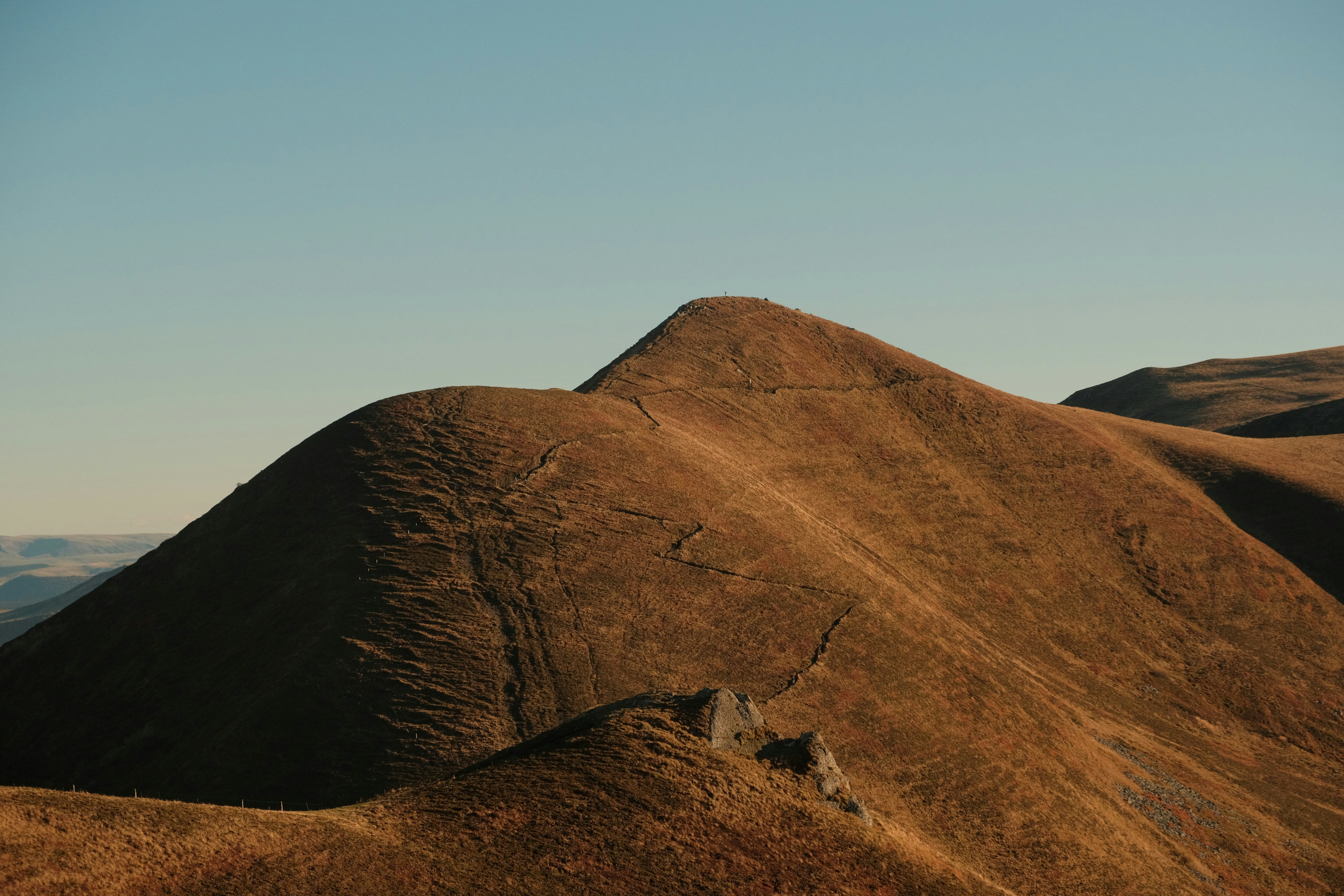Sunlit Saddle: The Quiet Summit of Autumn Hills