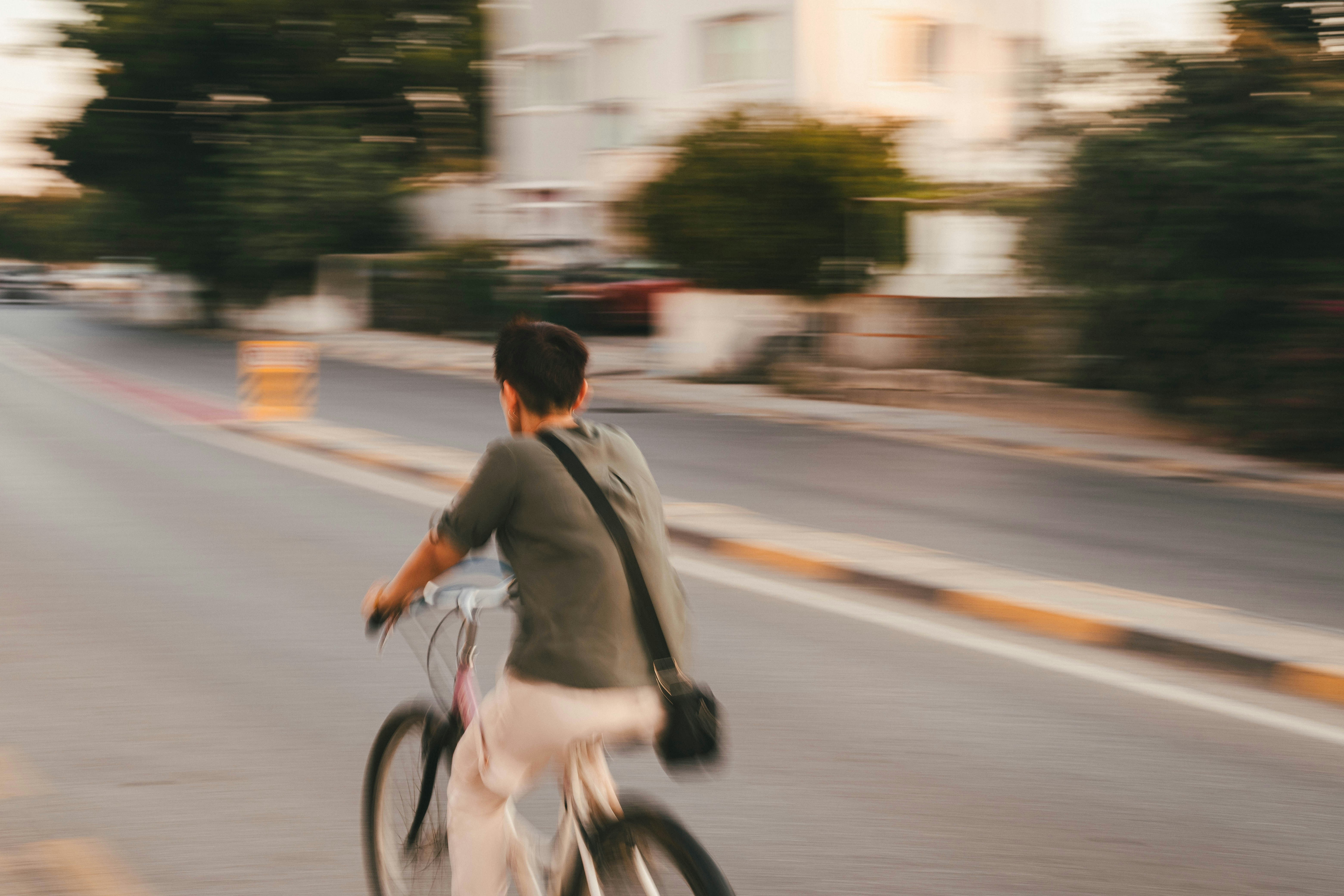 Rider in Motion: A Blurred Street Moment