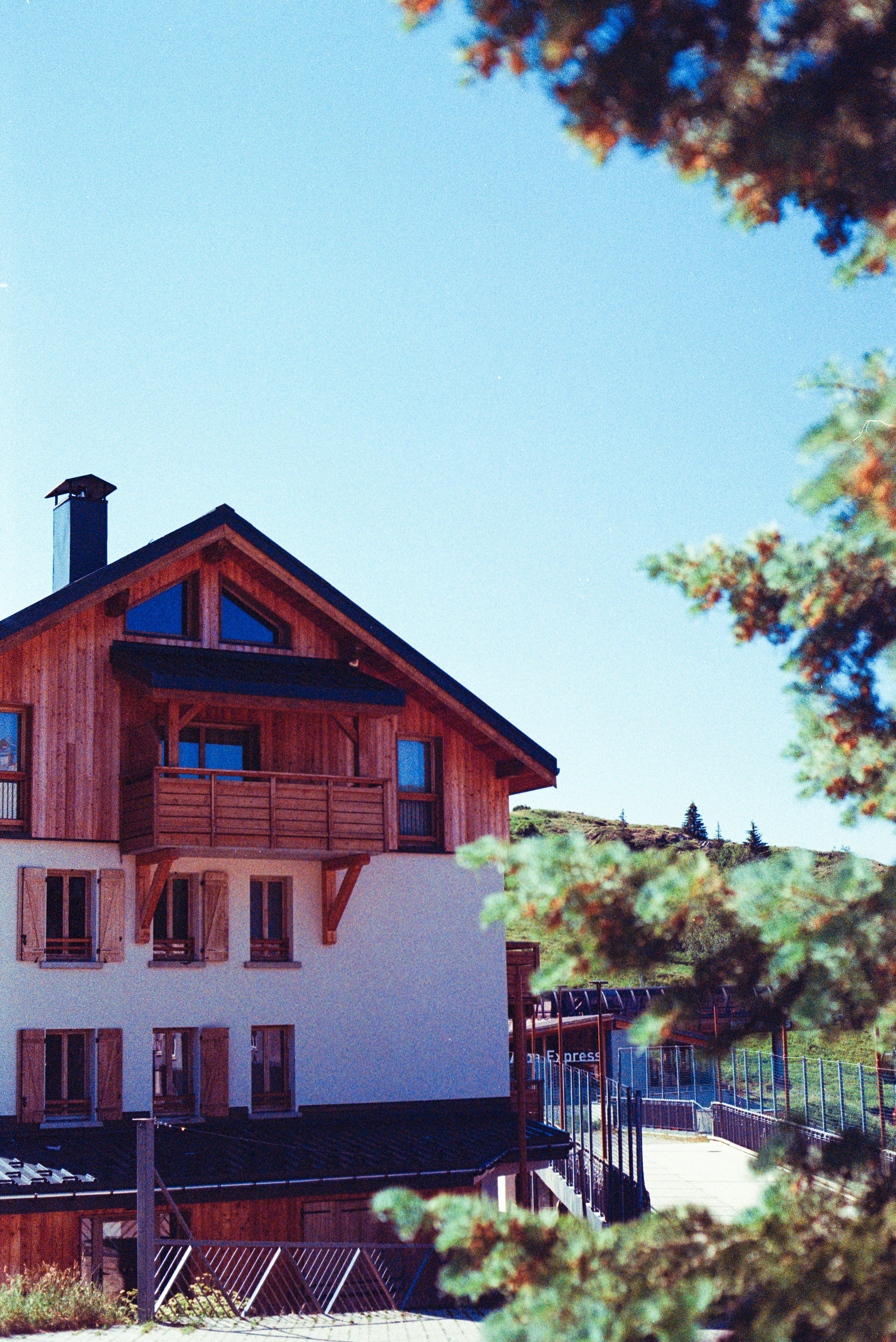 Wooden Chalet Climbing the Mountainside