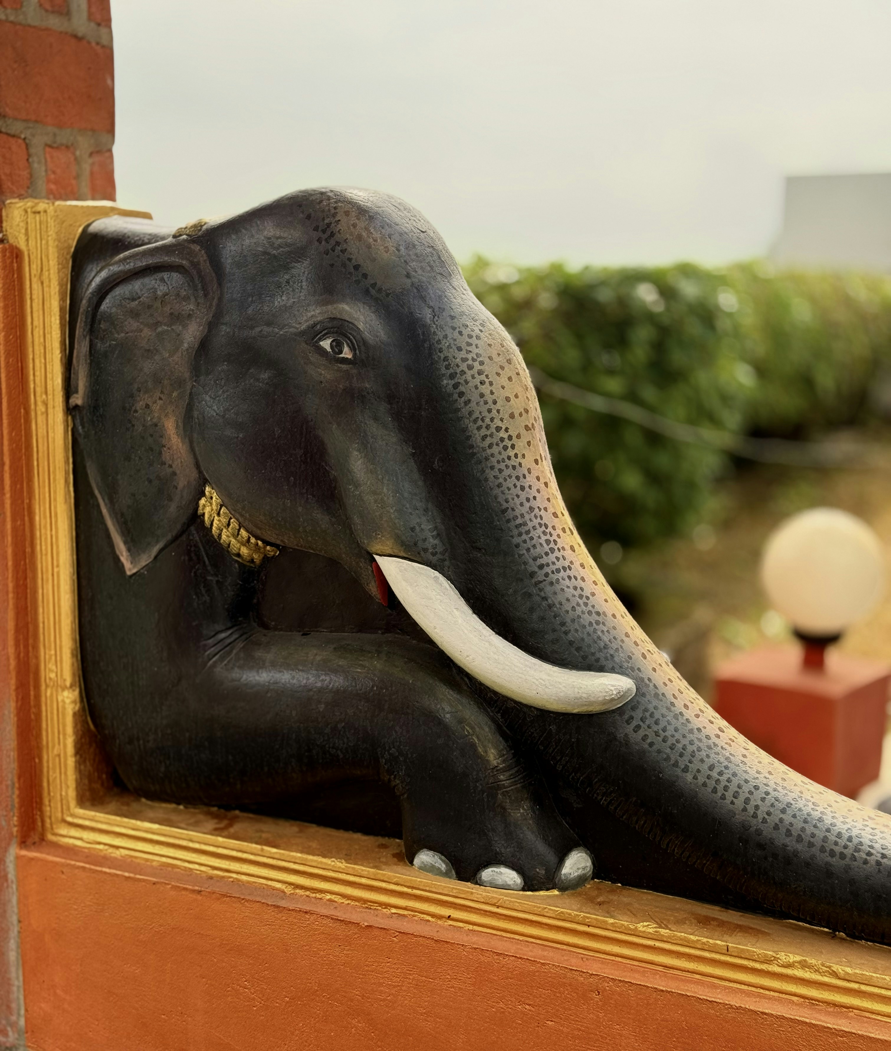 Solid Ivory Tusk: A Curved Trunk of Craft in a Quiet Gallery Corner