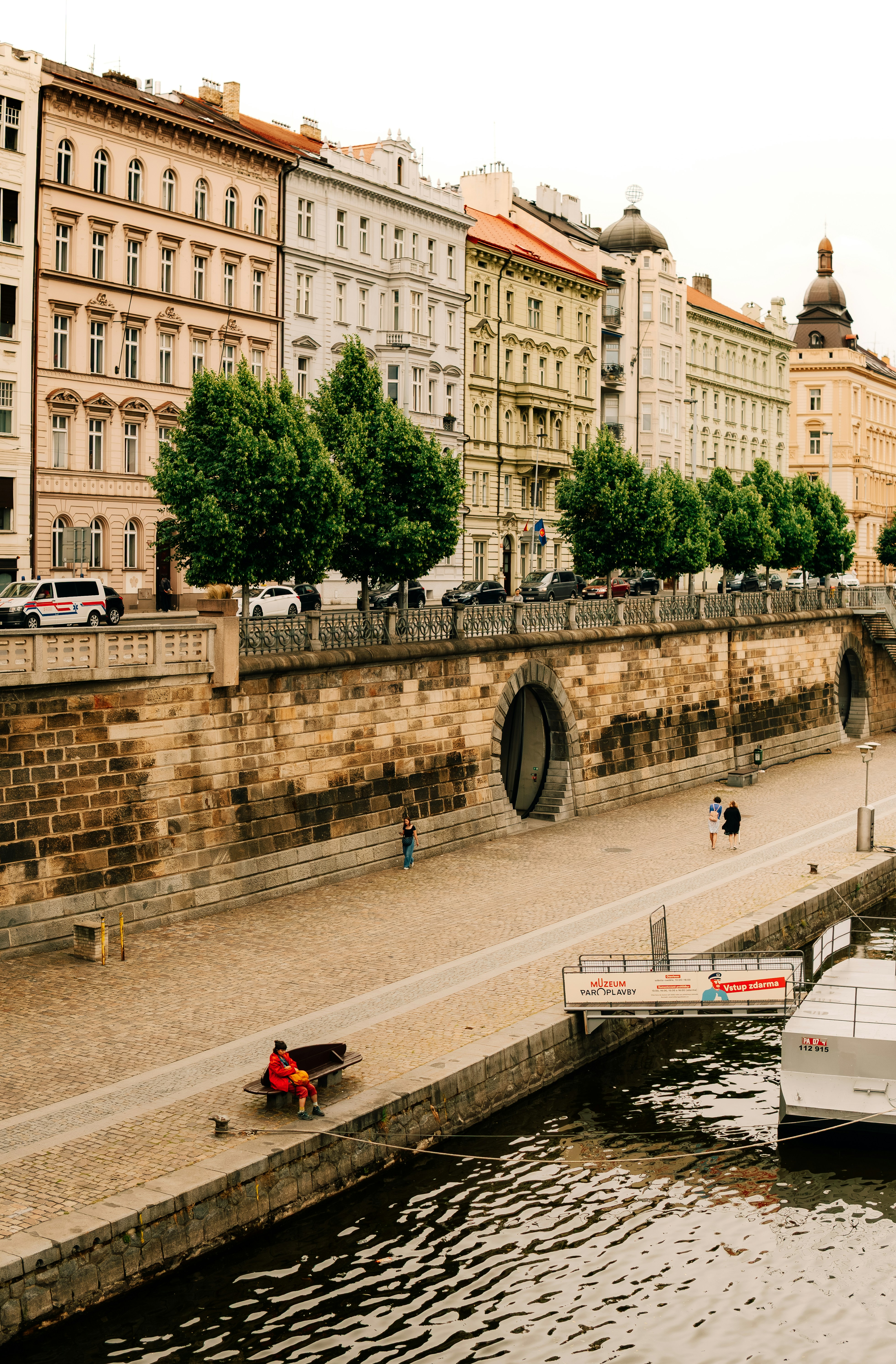 Sunlit riverside row: a quiet edge of the city