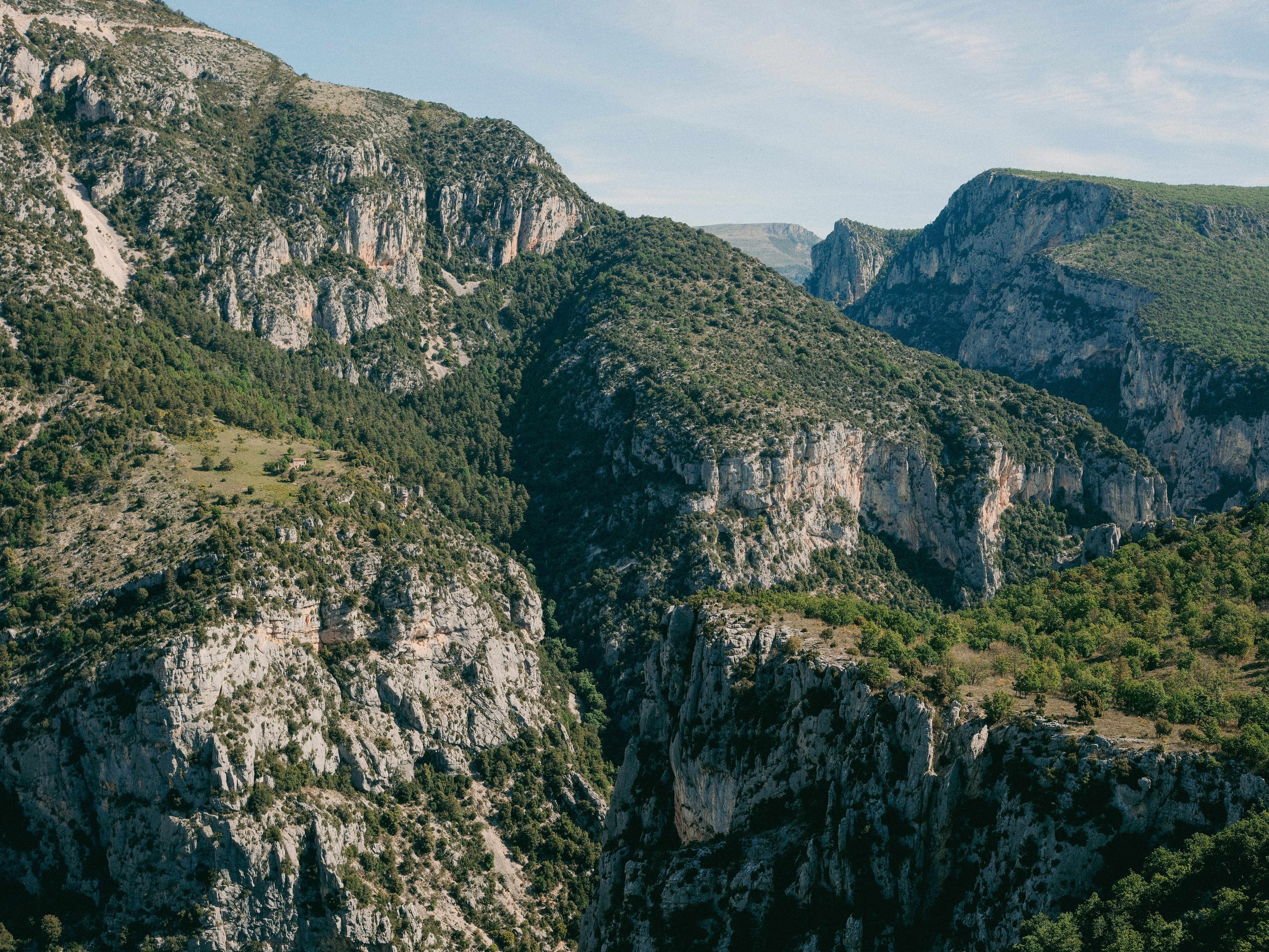 Echoes of the Gorge: Sunlit Ridge Workings Through Craggy Vistas