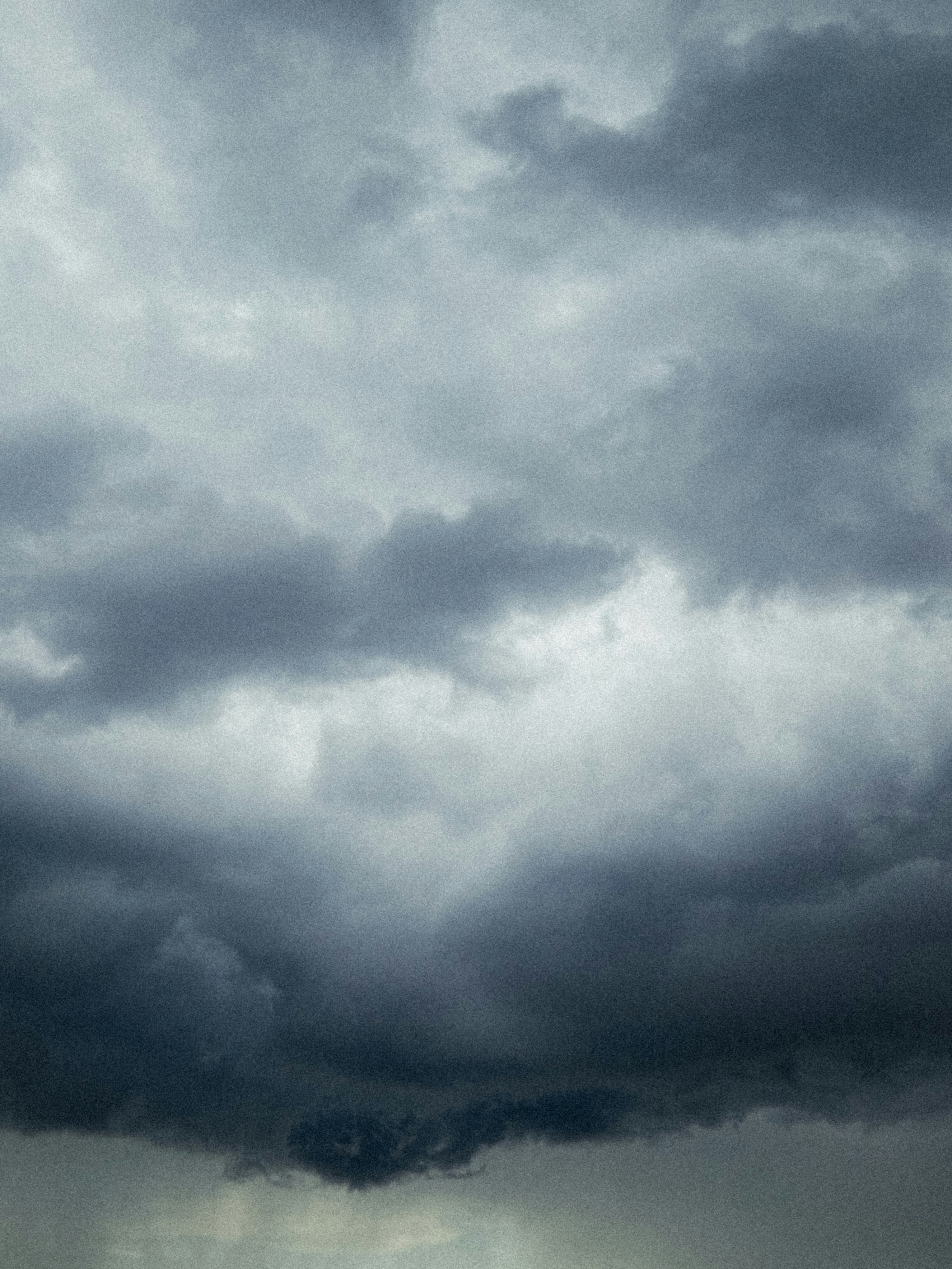 Storm Veil Over a Looming Horizon