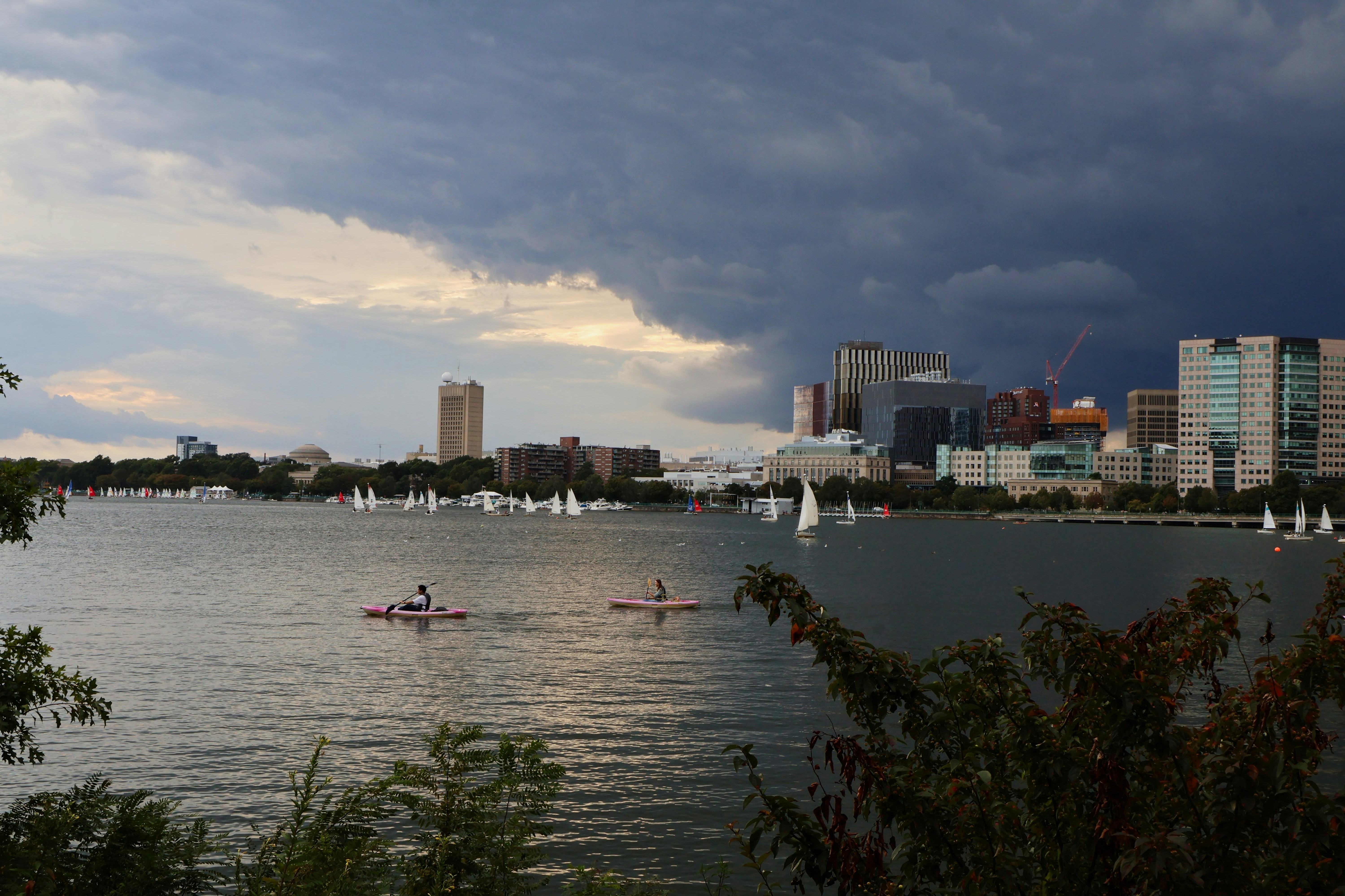 Cityscape by the Water: Boats, Skies, and a Turning City