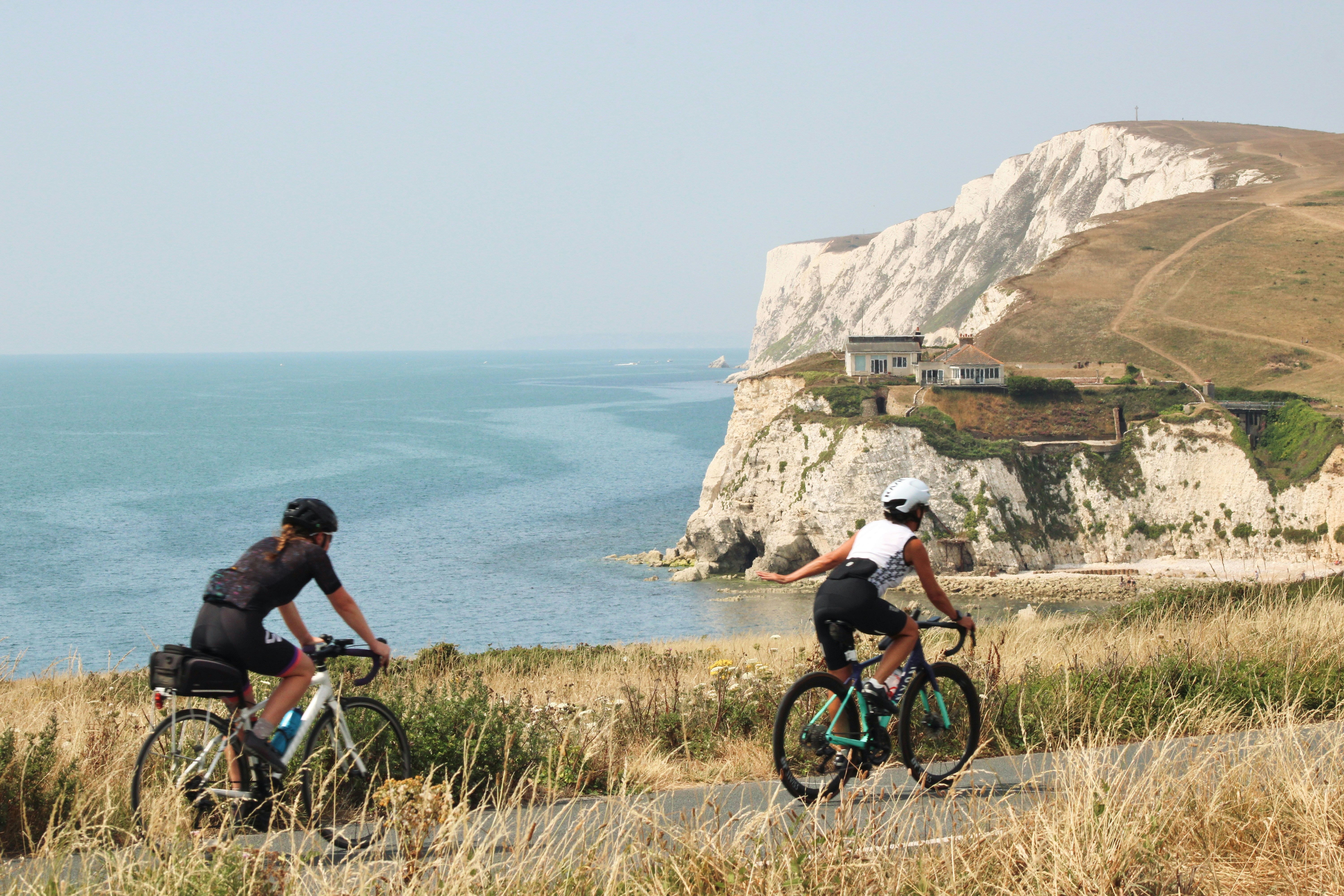 Ridge Ride: Bikers Trek a Coastal Cliff Path
