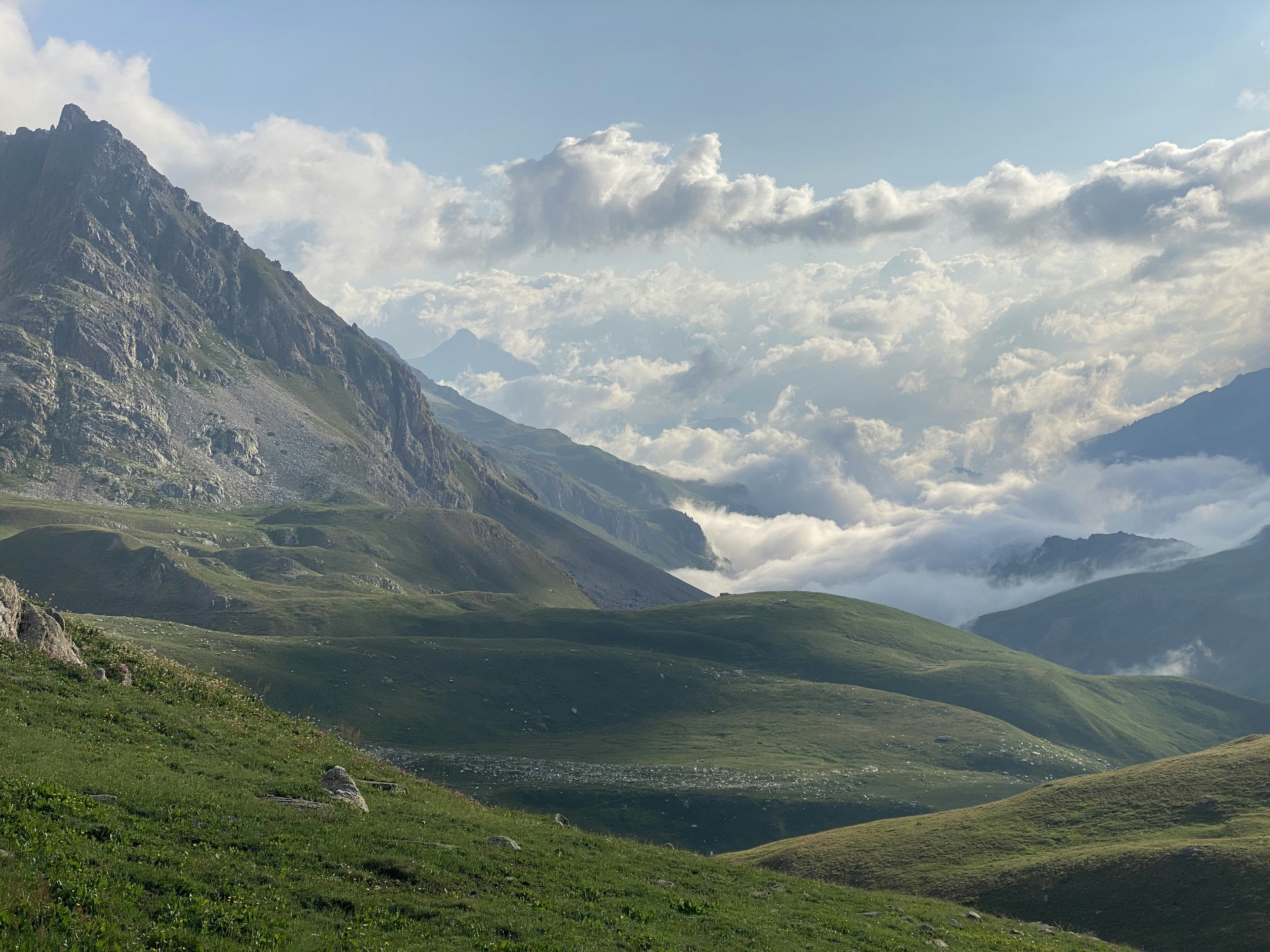 Mist-Carved Peaks Over a Quiet Alpine Valley