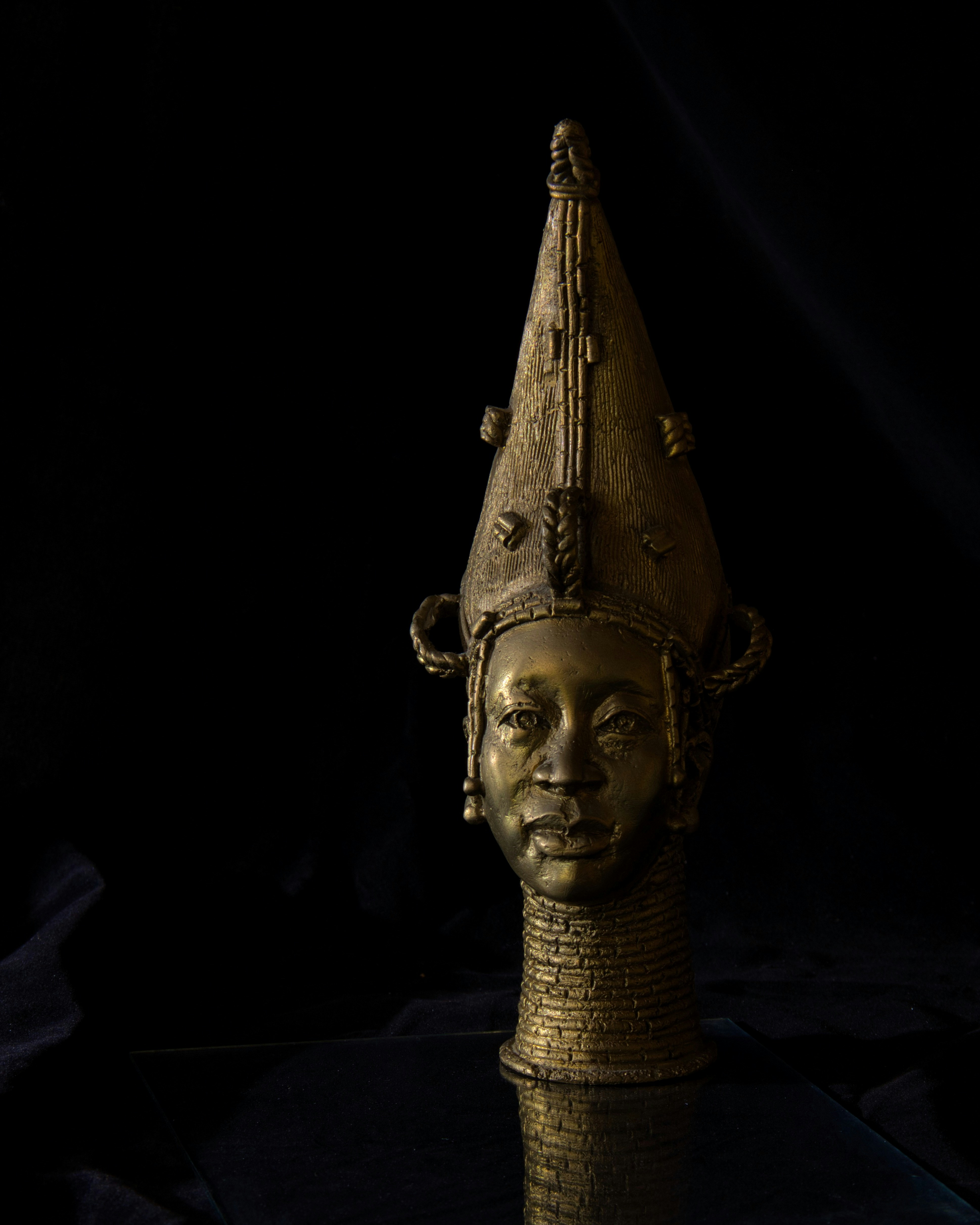 Golden Headdress, Silent Gaze: A Terracotta-tinged Ivory Queen