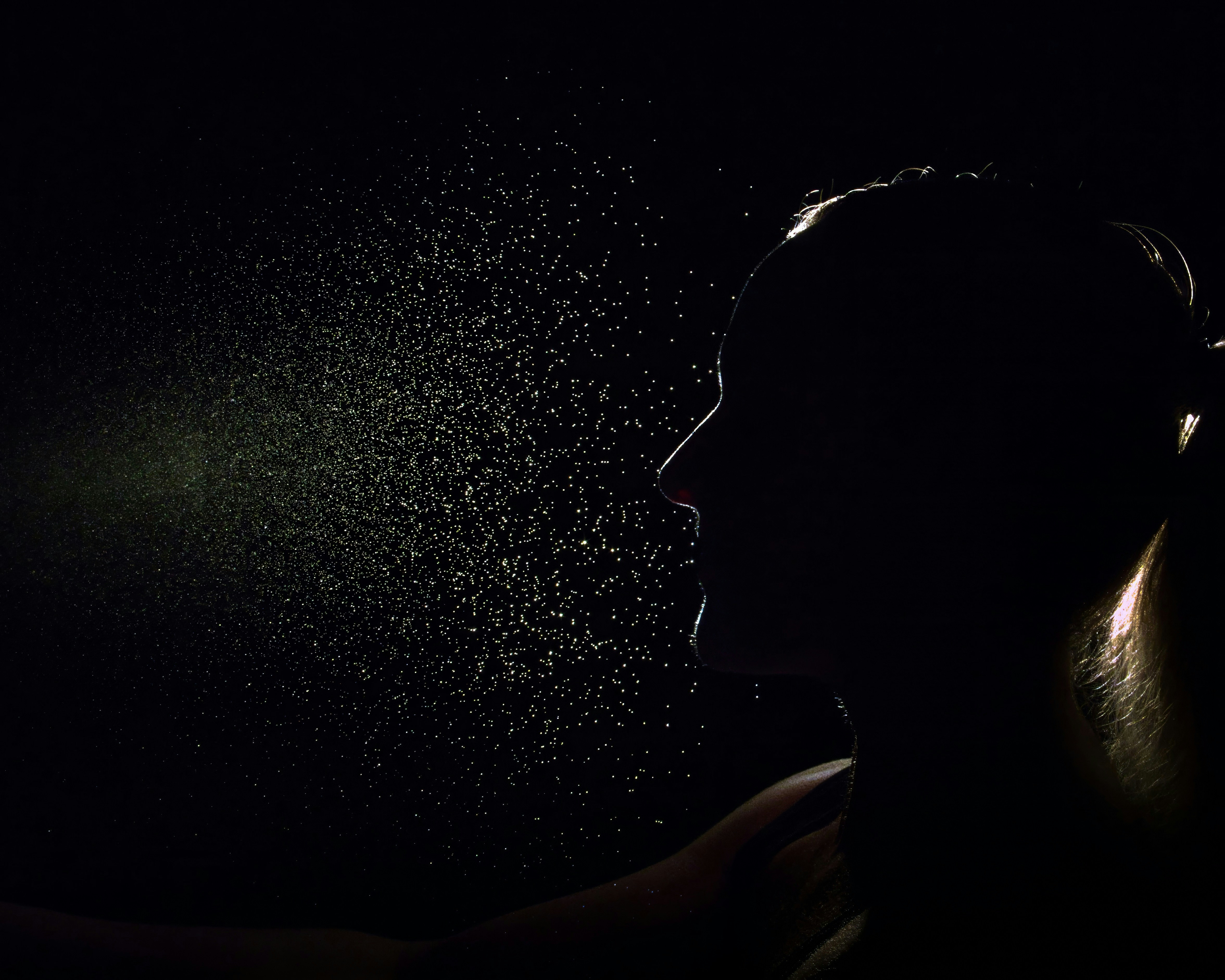 Silhouette in the Spark: A Quiet Burst of Light